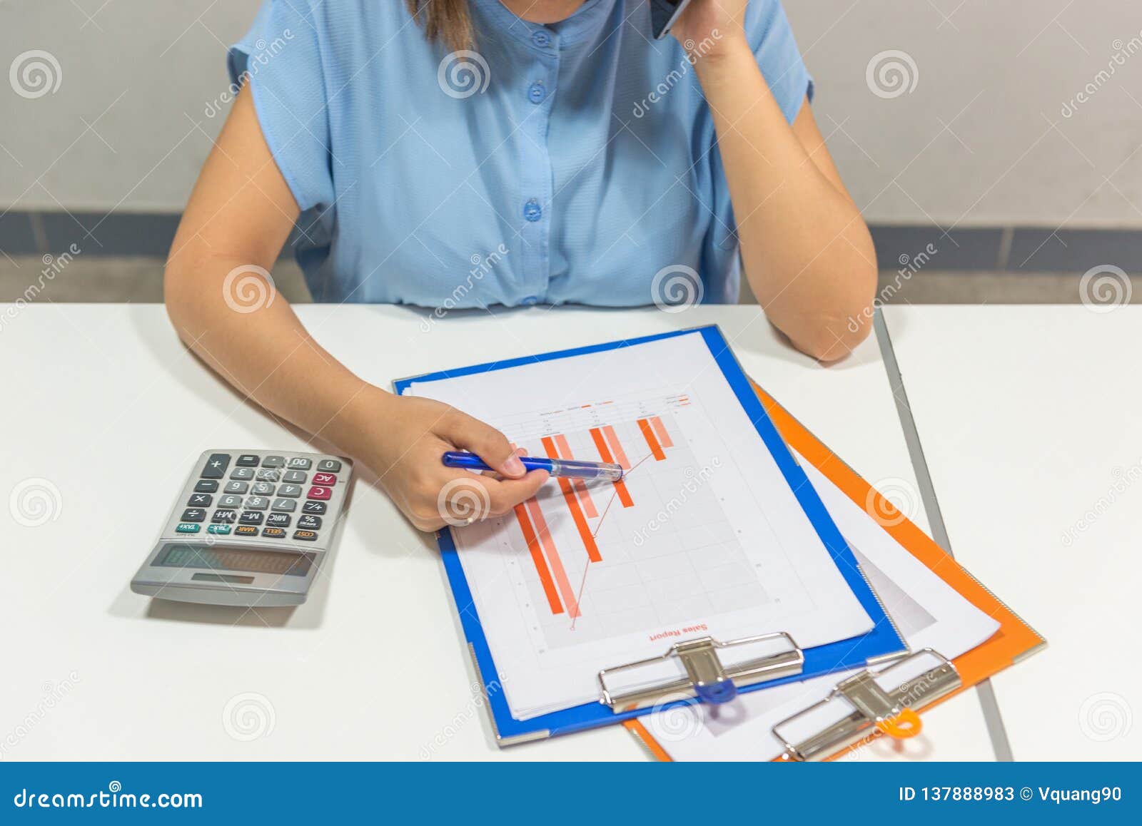 Office Employee Checking Sales Report at Workplace Stock Image - Image ...