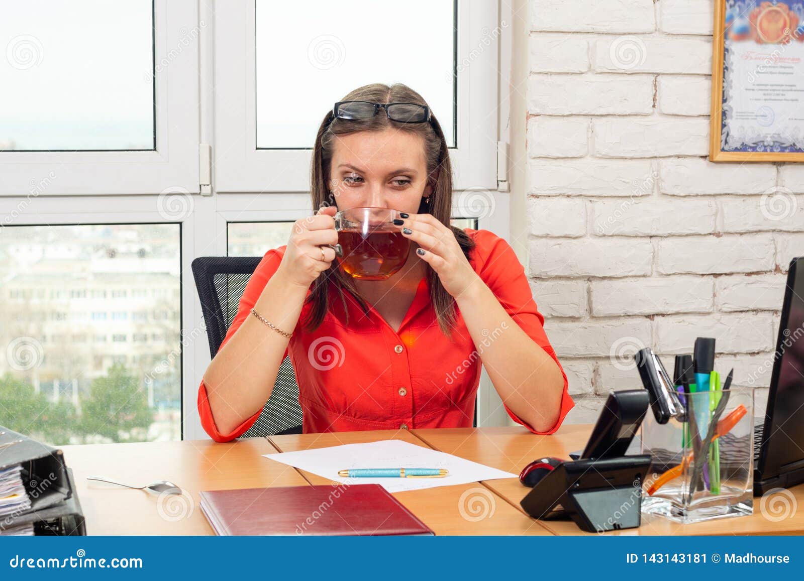 An Office Employee Drinks Tea at the Workplace at Lunchtime Stock Image ...