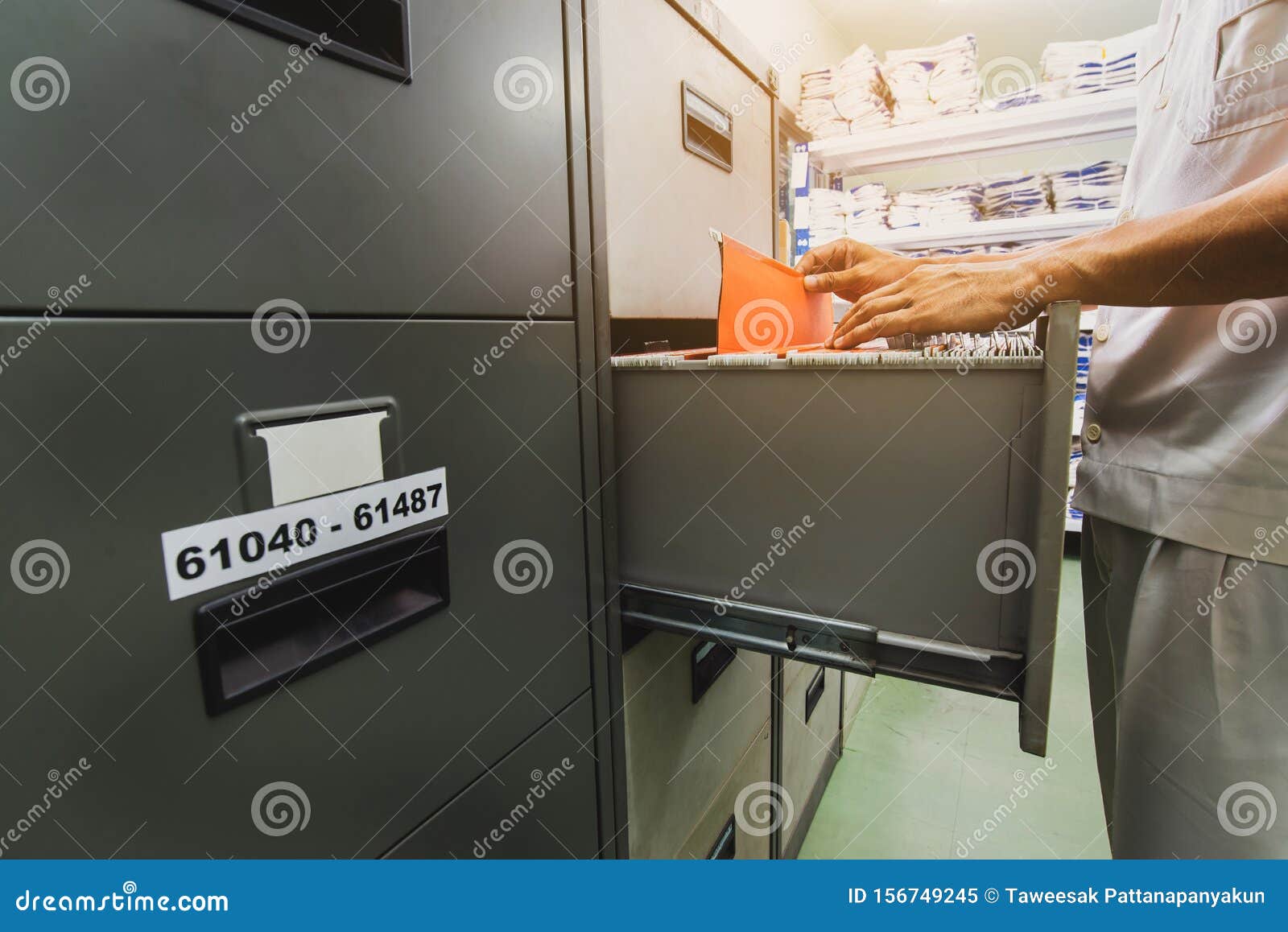 Office Employee Searching Files in Drawers Stock Image - Image of data ...