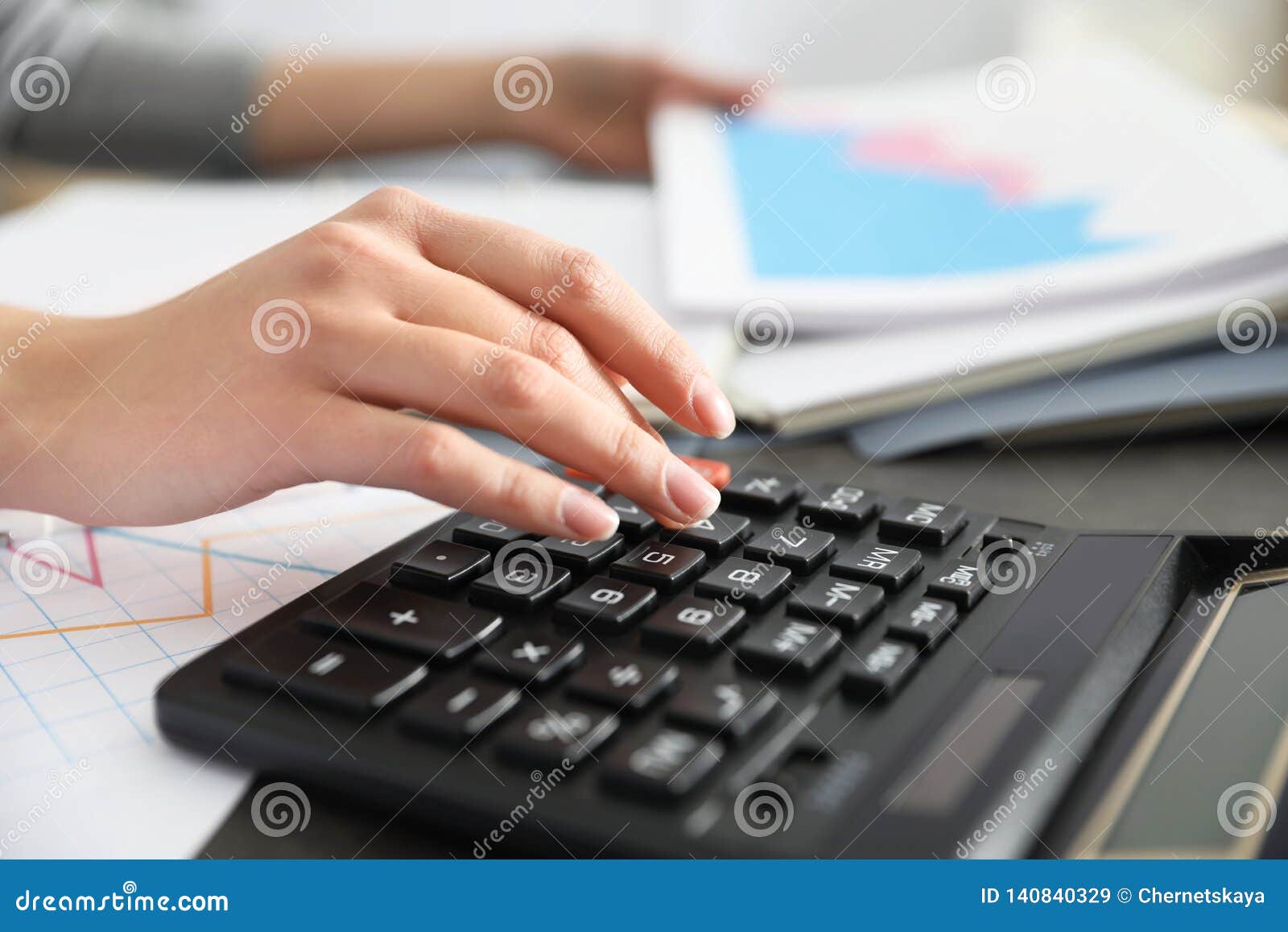 Office Employee Working with Calculator and Documents Stock Image ...