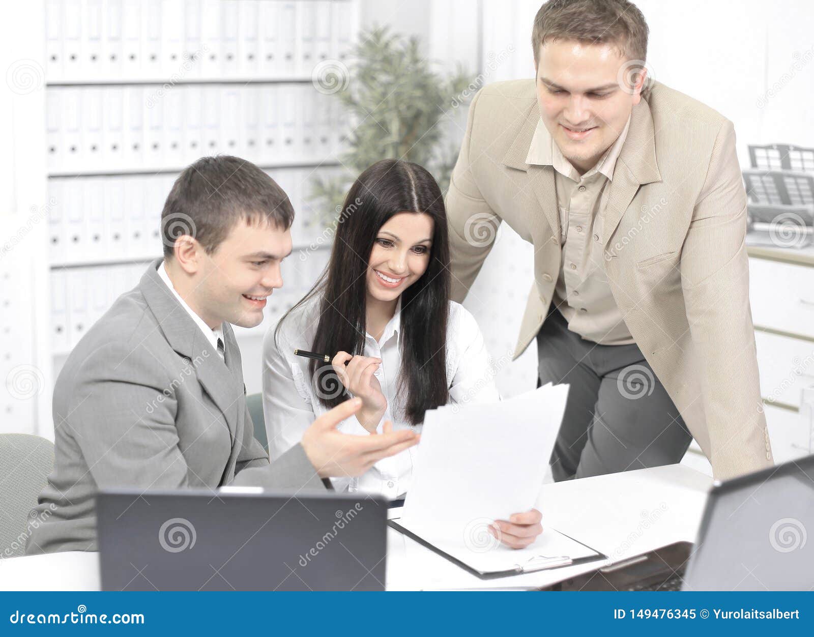 Office Employees Discussing Documents in the Office Stock Image - Image ...