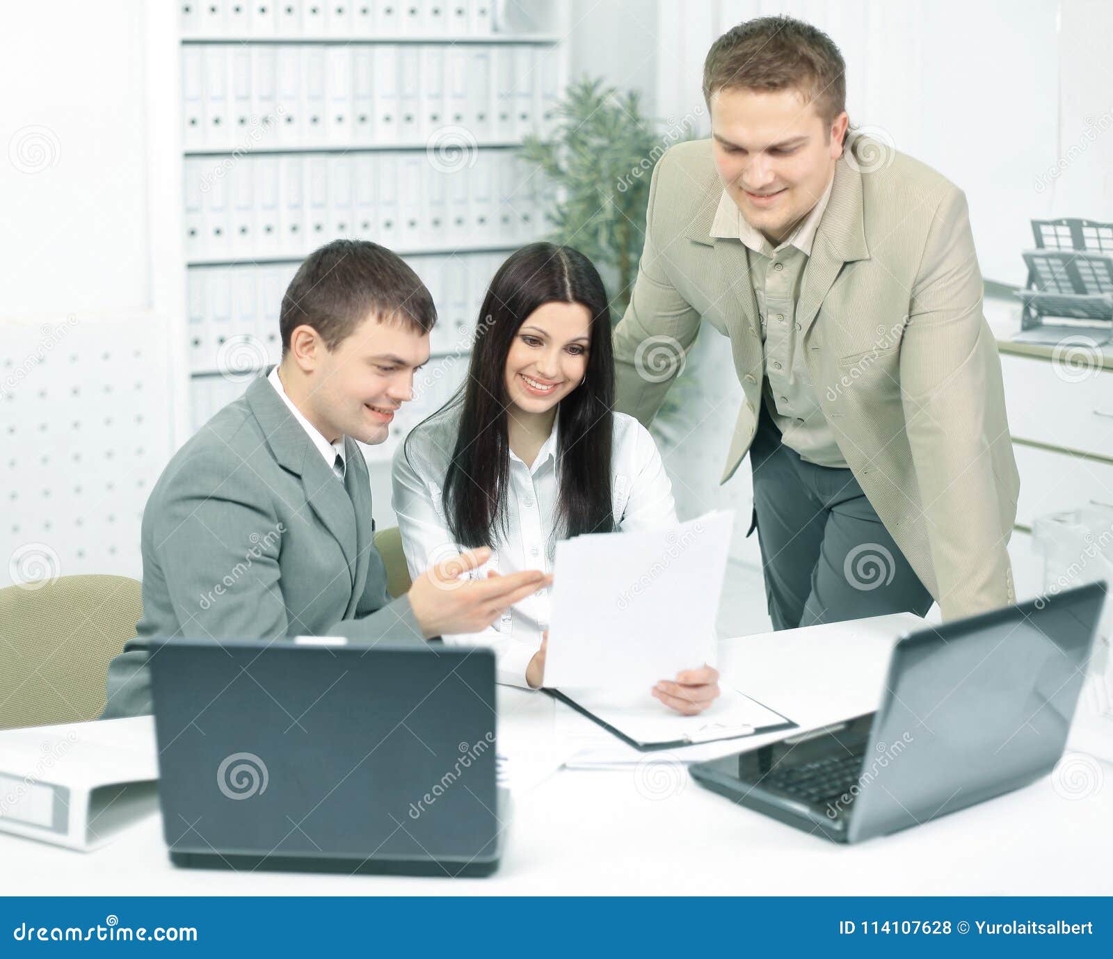 Office Employees Discussing Documents in the Office Stock Photo - Image ...