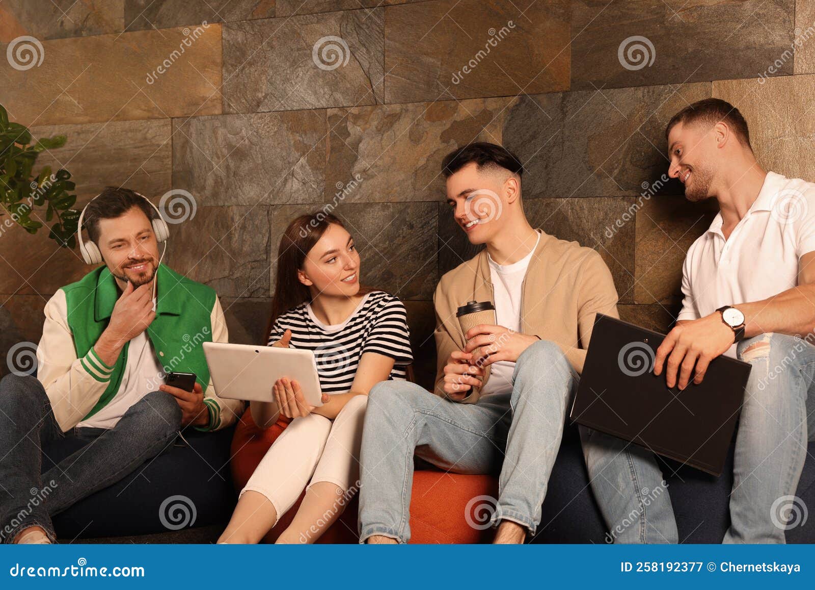 Office Employees Enjoying Break Together in Recreation Room at Work ...
