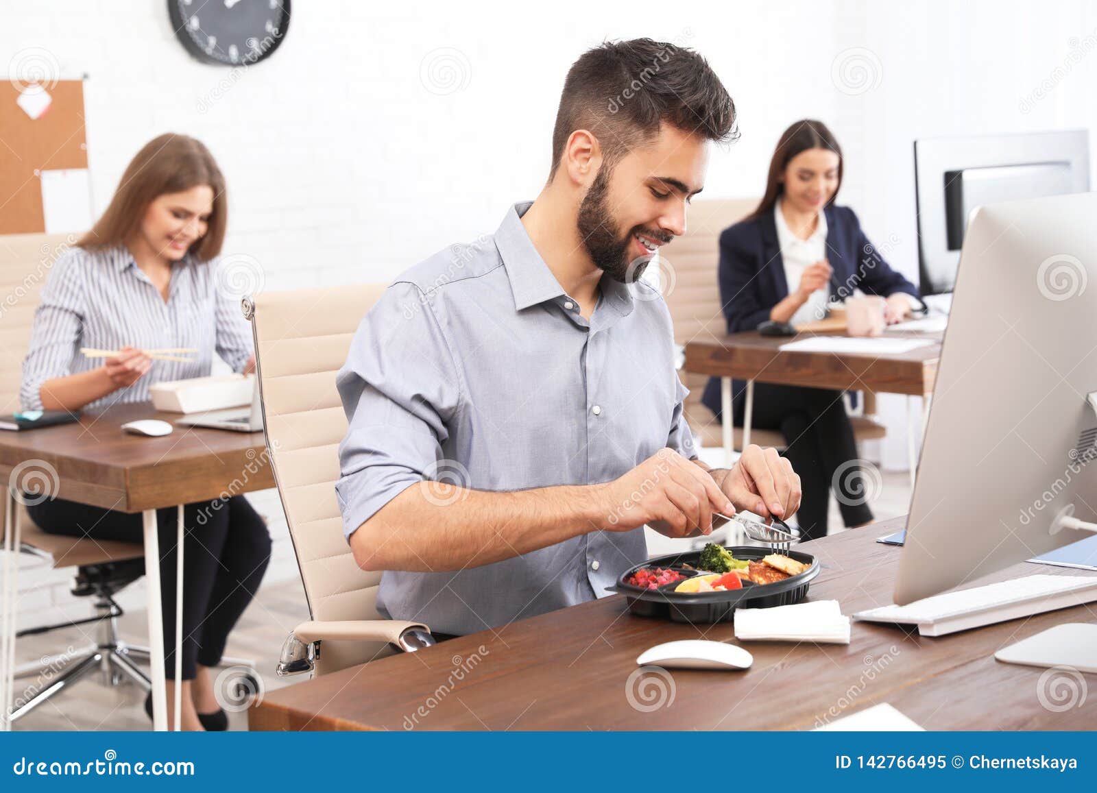 Office Employees Having Lunch at Workplace. Food Stock Image - Image of ...