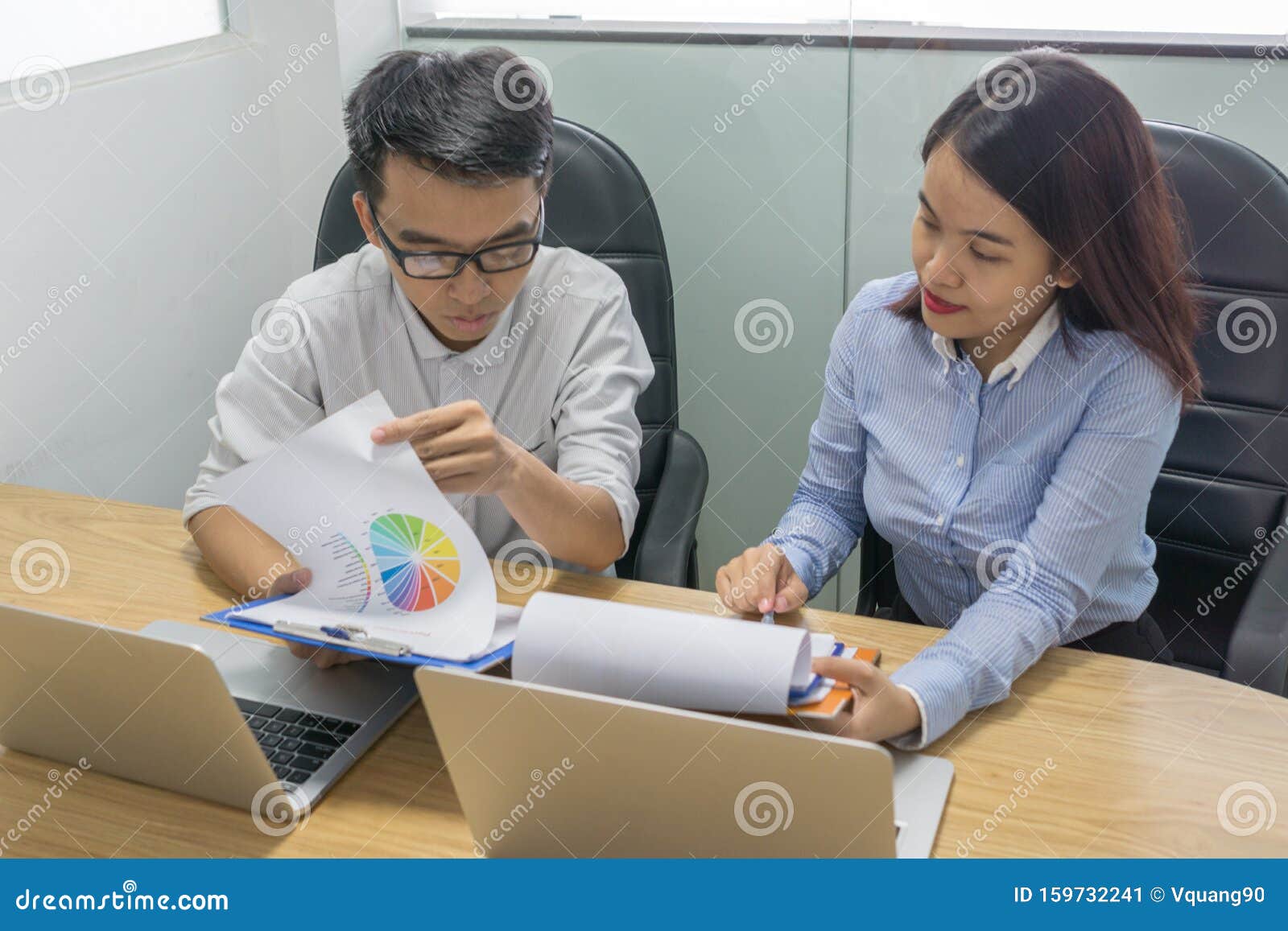 Office Employees Reading Financial Reports in the Office Stock Image ...