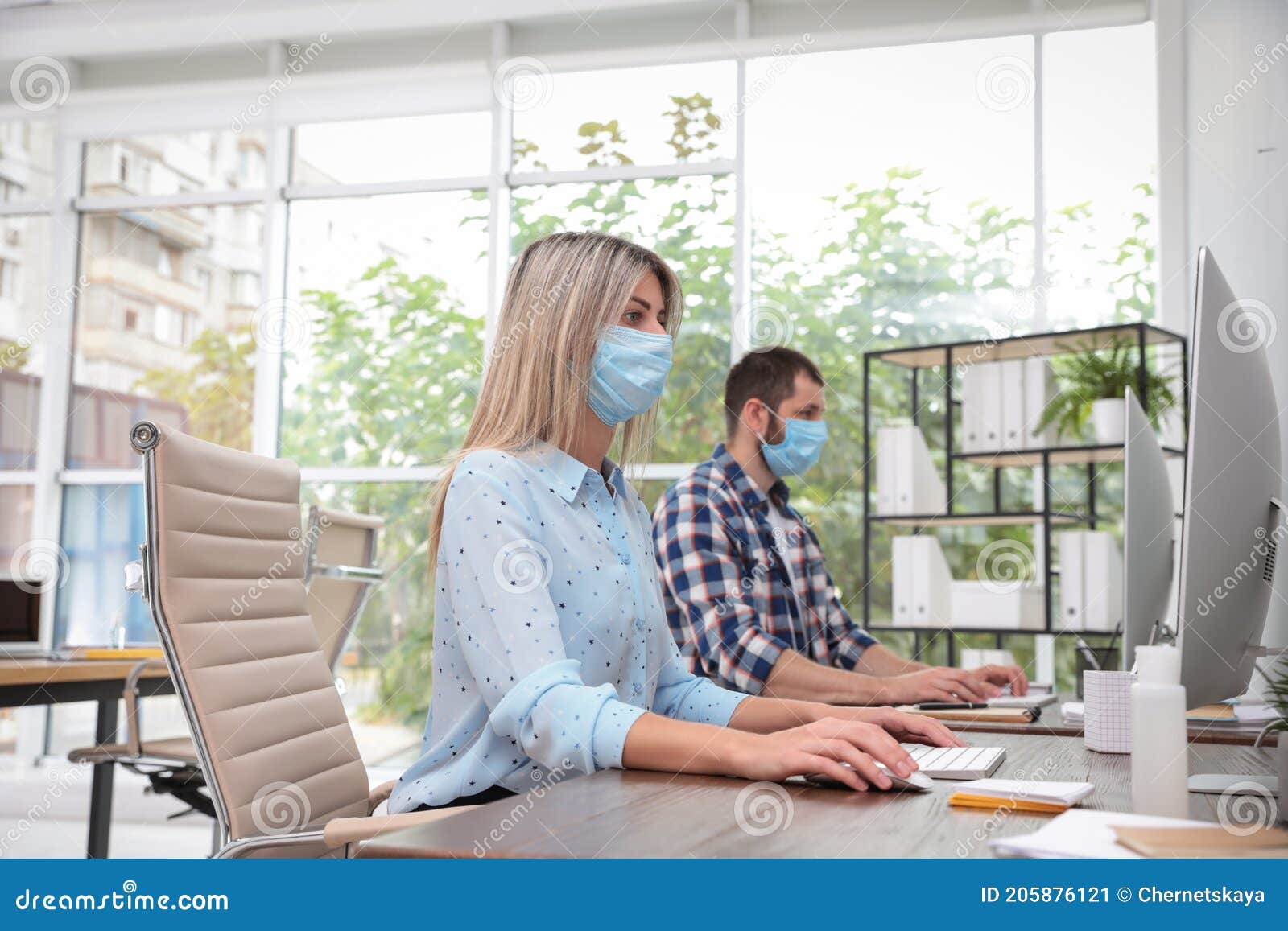 Office Employees in Respiratory Masks at Workplace Stock Image - Image ...