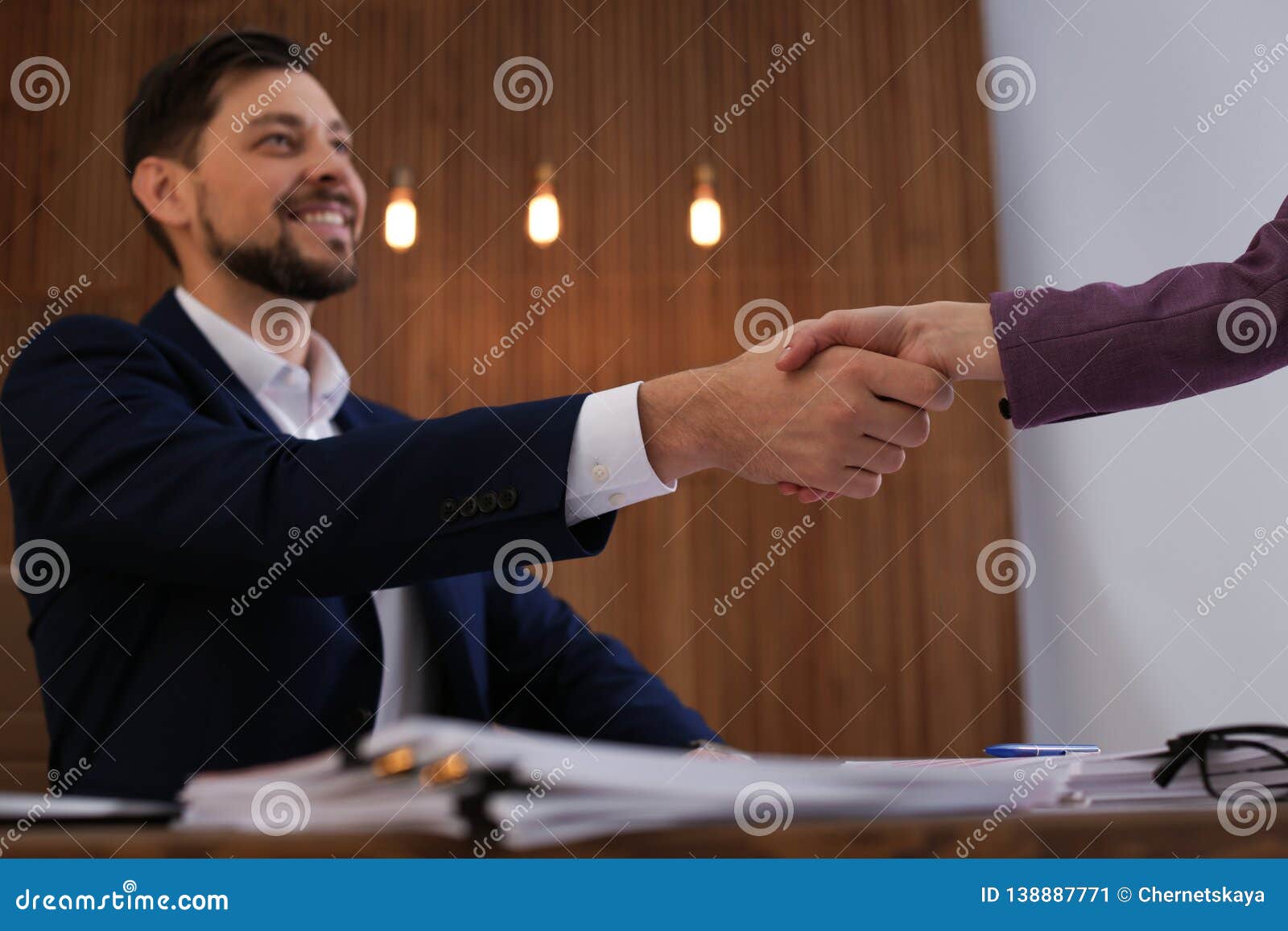 Office Employees Shaking Hands Over Table with Documents Stock Image ...