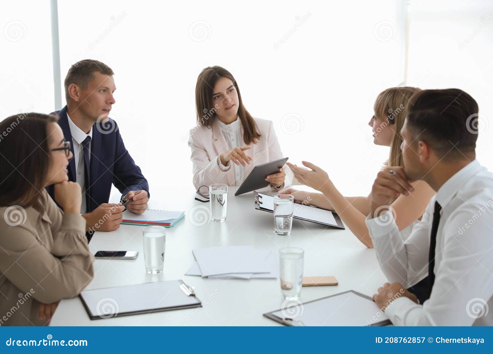 Office Employees Talking at Table during Meeting Stock Image - Image of ...