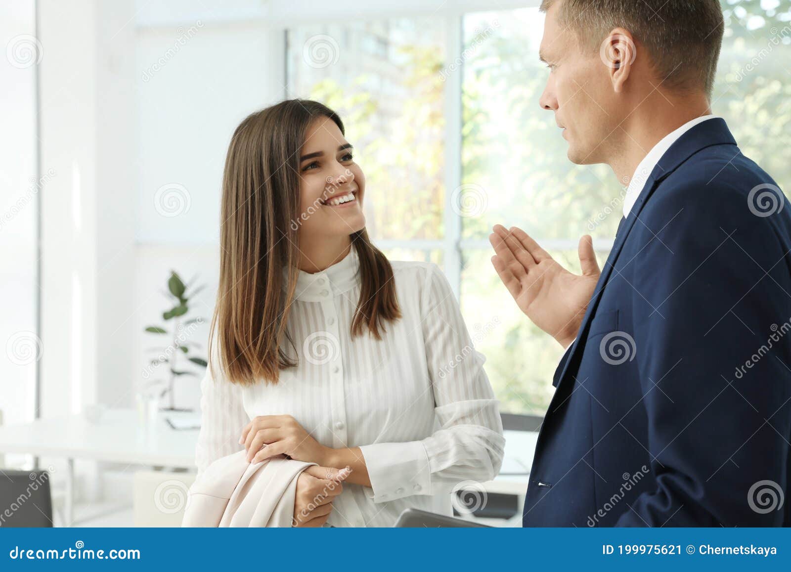 Office Employees Talking at Workplace during Break Stock Image - Image ...