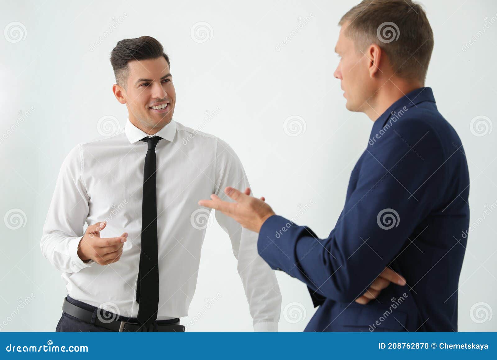 Office Employees Talking at Workplace during Break Stock Photo - Image ...