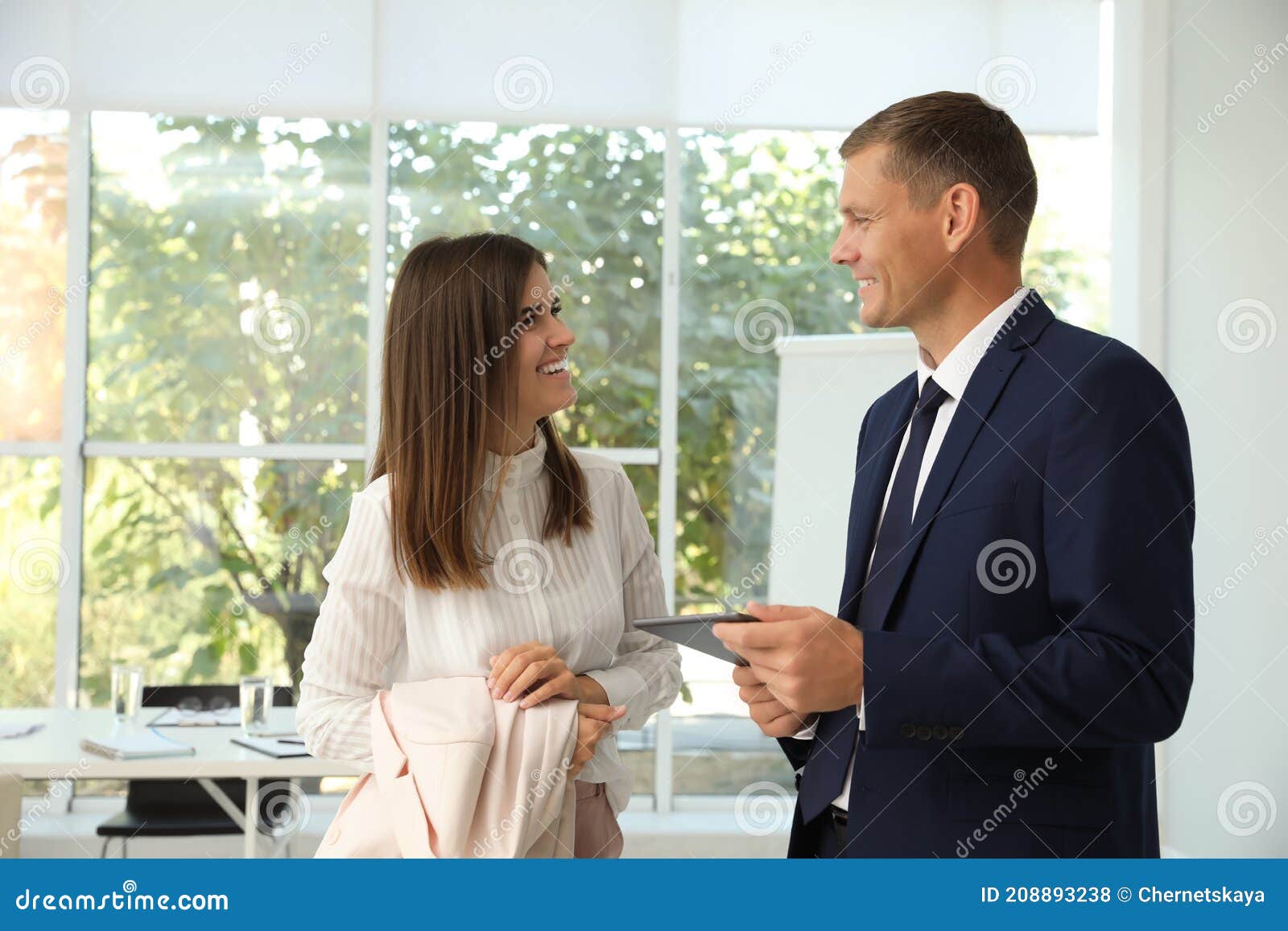 Office Employees Talking at Workplace during Break Stock Photo - Image ...