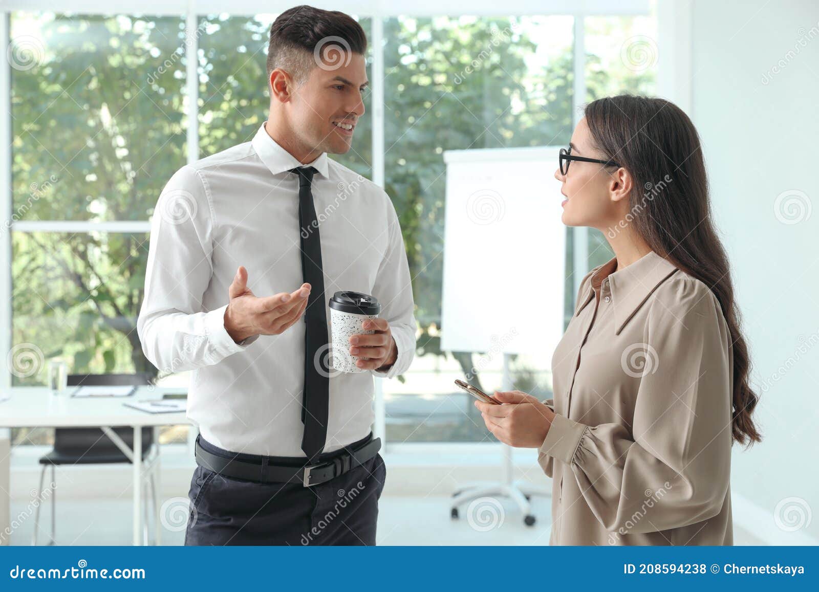 Office Employees Talking at Workplace during Break Stock Photo - Image ...