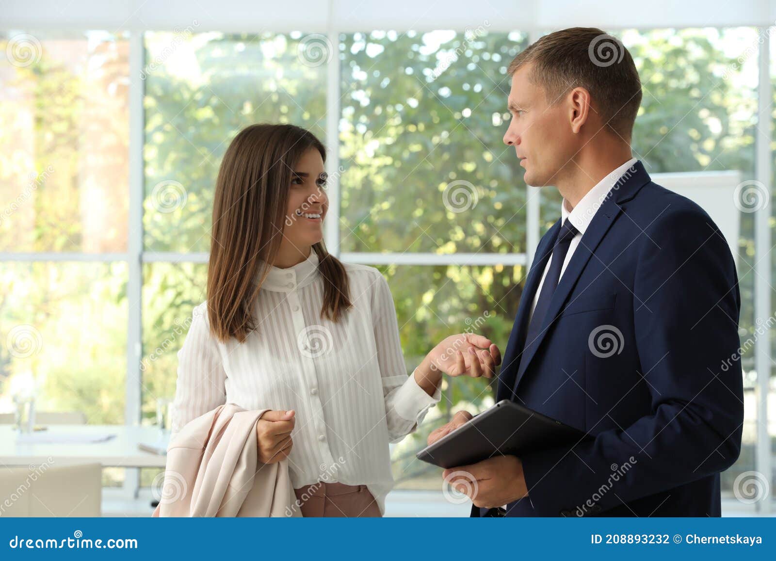 Office Employees Talking at Workplace during Break Stock Photo - Image ...