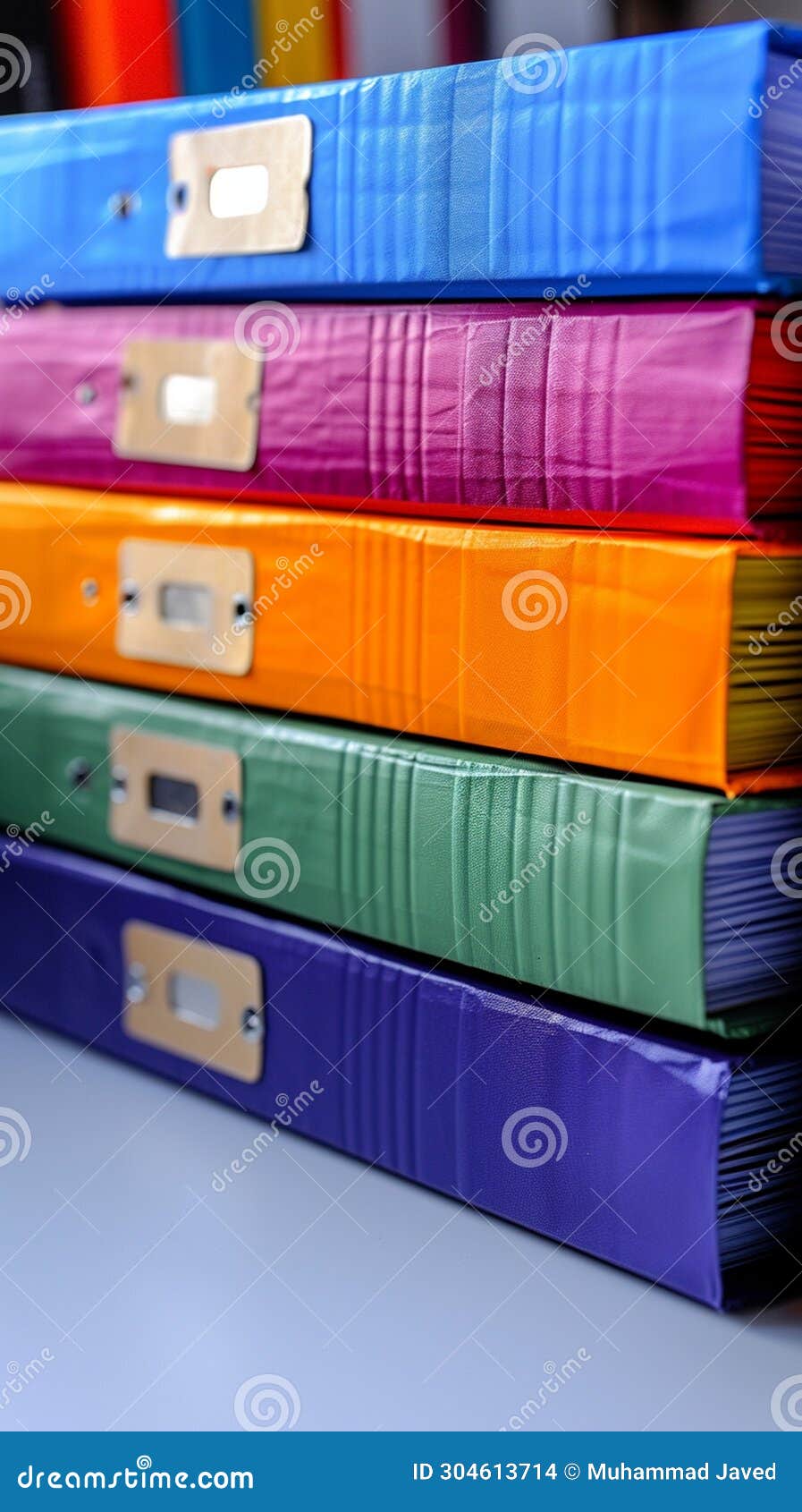 Office Essentials Multi Colored File Folders Neatly Stacked on a Table ... Office Essentials Multi Colored File Folders Neatly Stacked on a Table ...