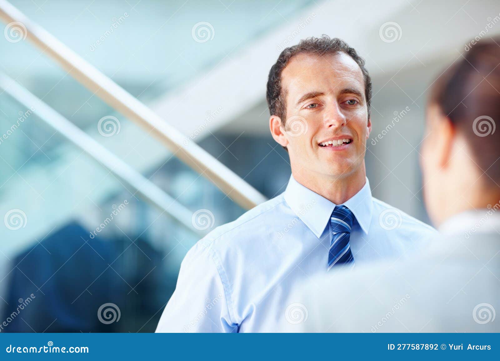 An Office Executive Having Conversation with His Colleague. Portrait of ...
