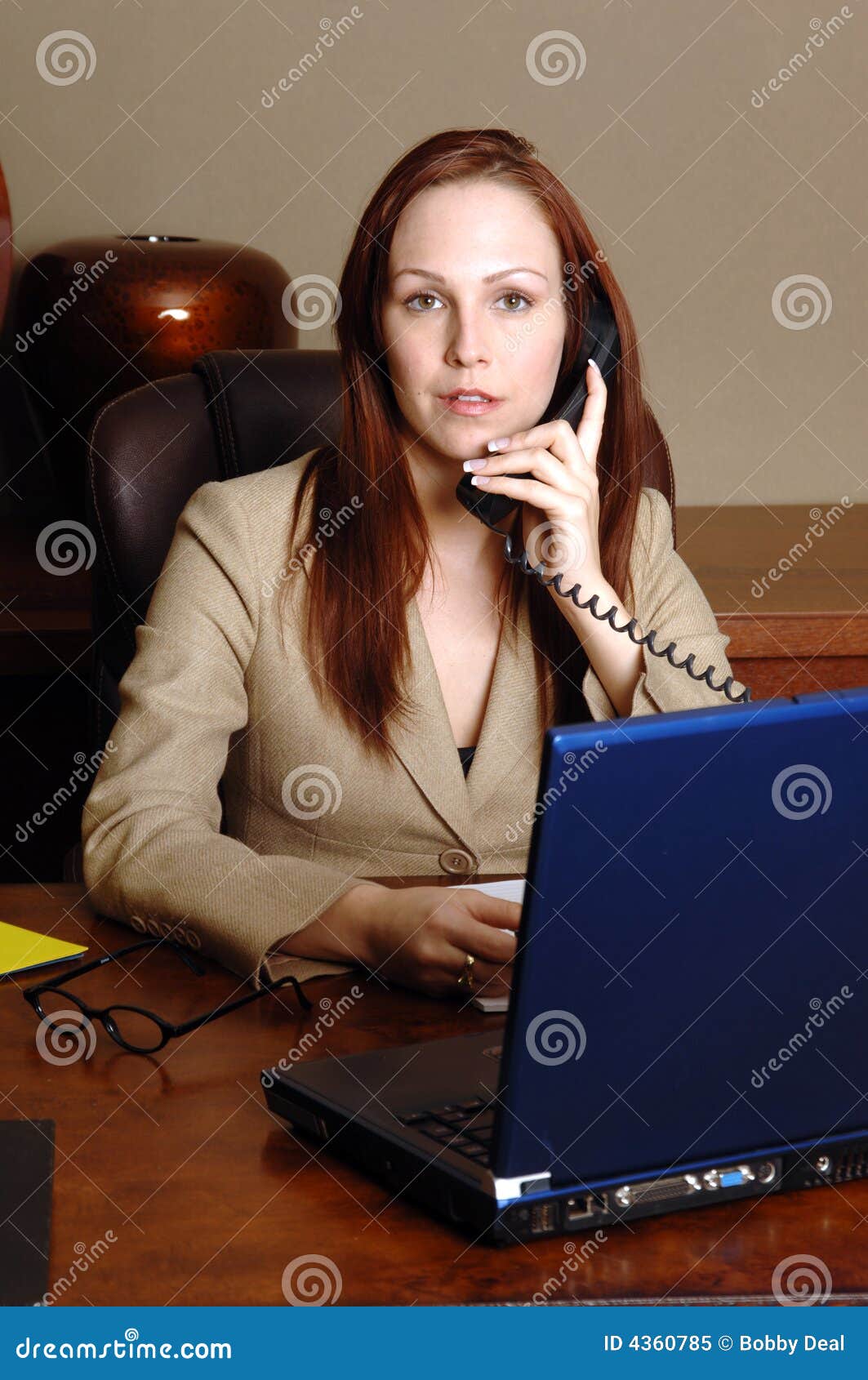 Office Executive on Phone stock image. Image of suit, desk - 4360785