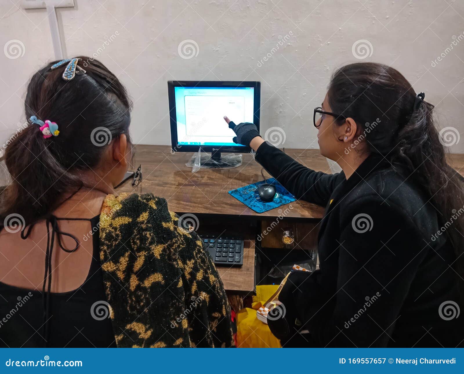 A Office Girl Pointing Finger into the Computer Screen during Teaching ...