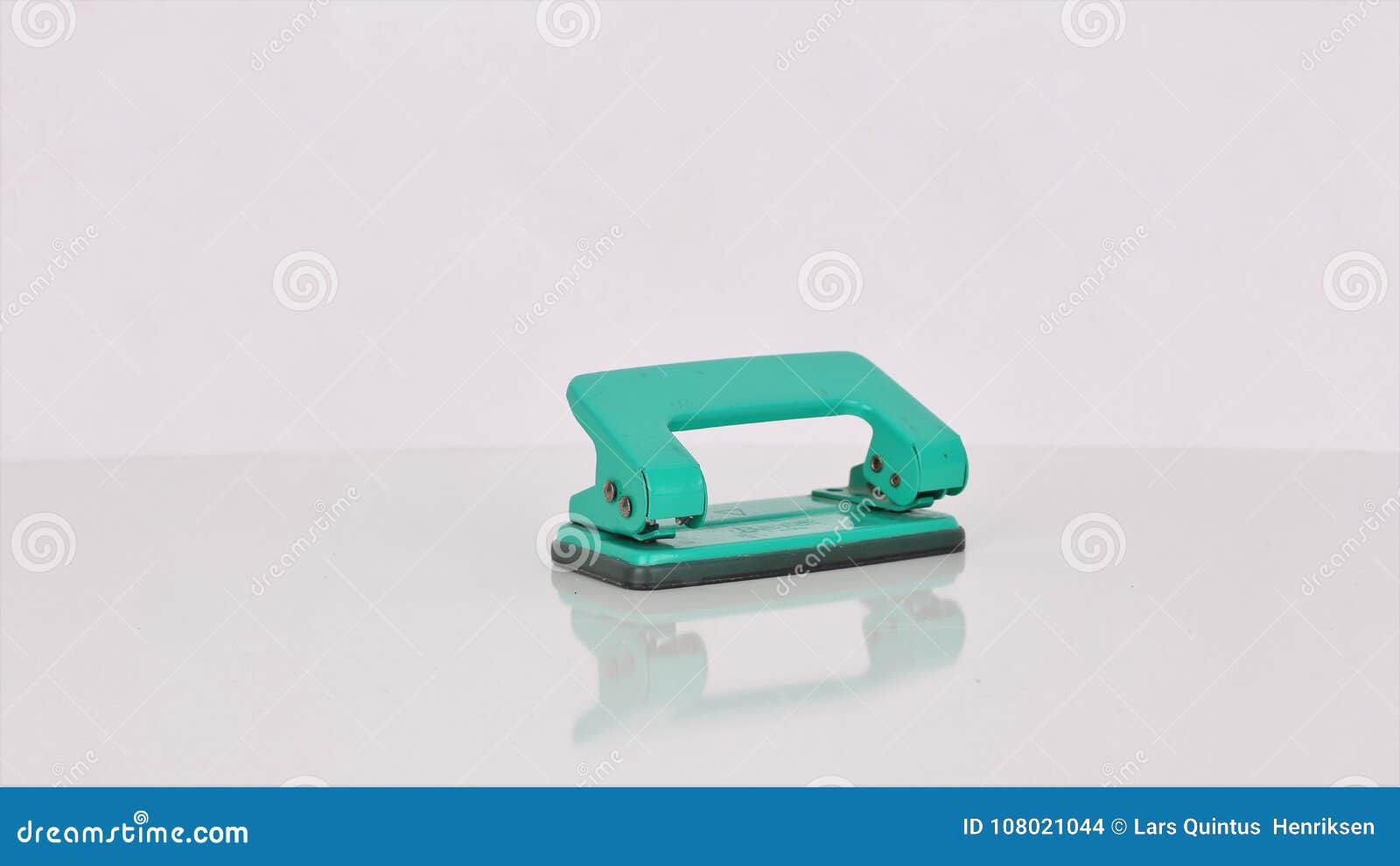 Office hole punch in green stock photo. Image of hollow - 108021044
