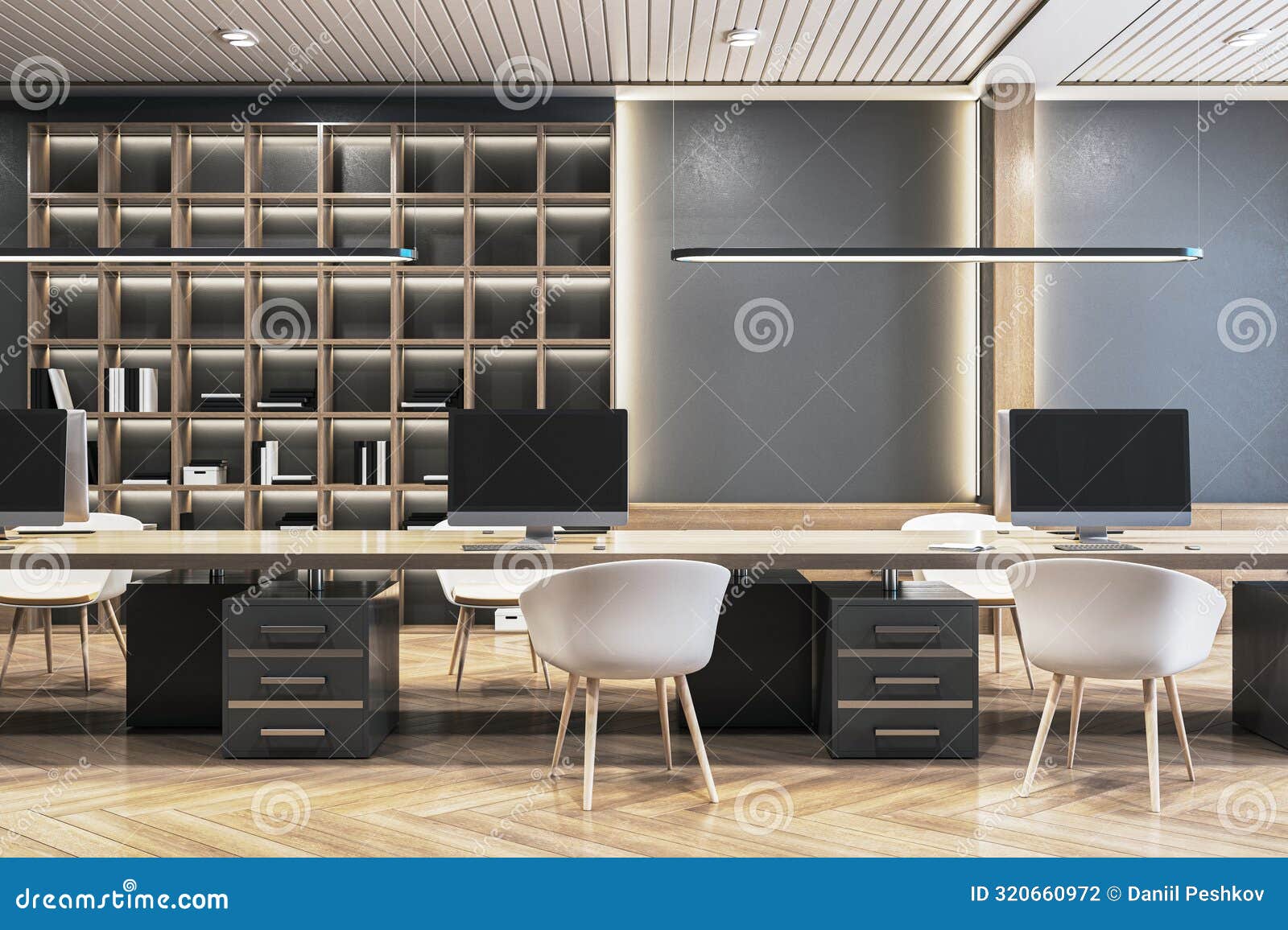 An Office Interior with Computer Monitors on Desks, a Shelving Unit, on ...