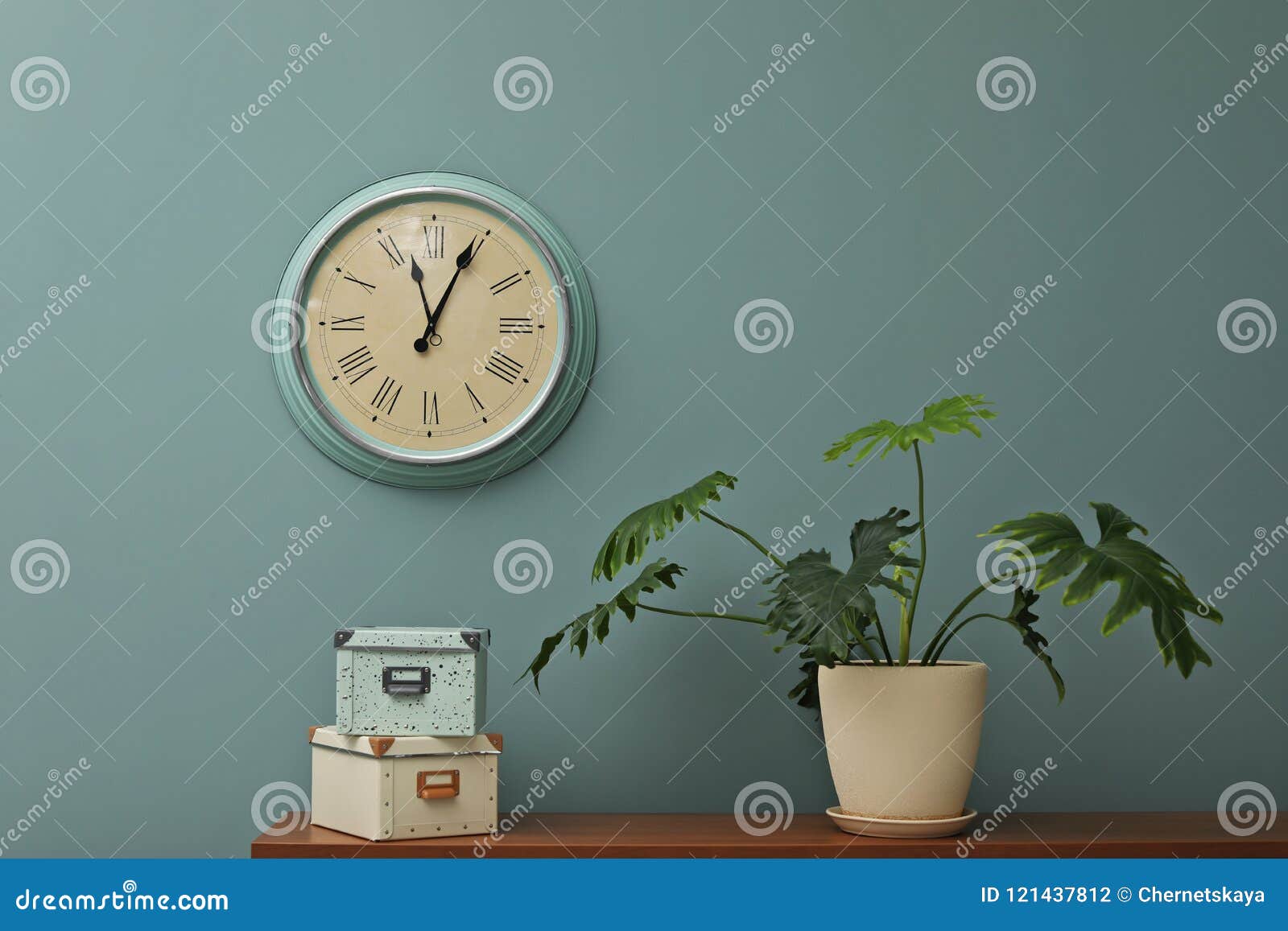 Office Interior with Houseplant and Clock on Wall Stock Photo - Image ...