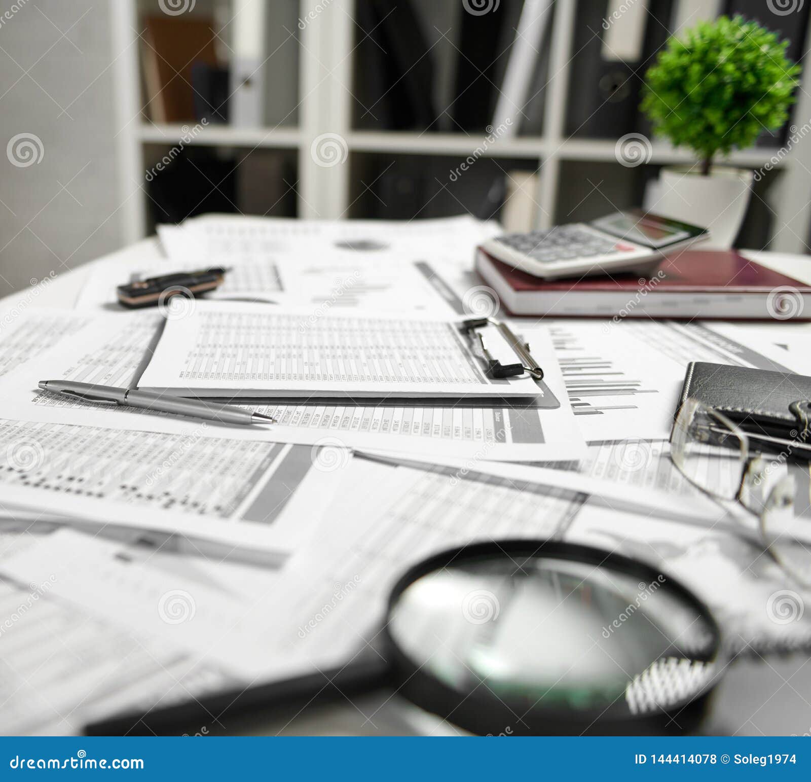 Office Interior - the Table with Documents, Reports and Shelves with ...