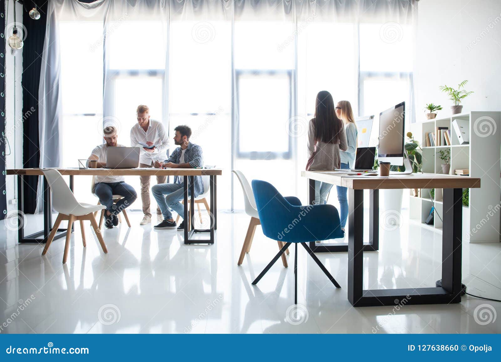 Office Life. Group of Young Business People Working and Communicating ...