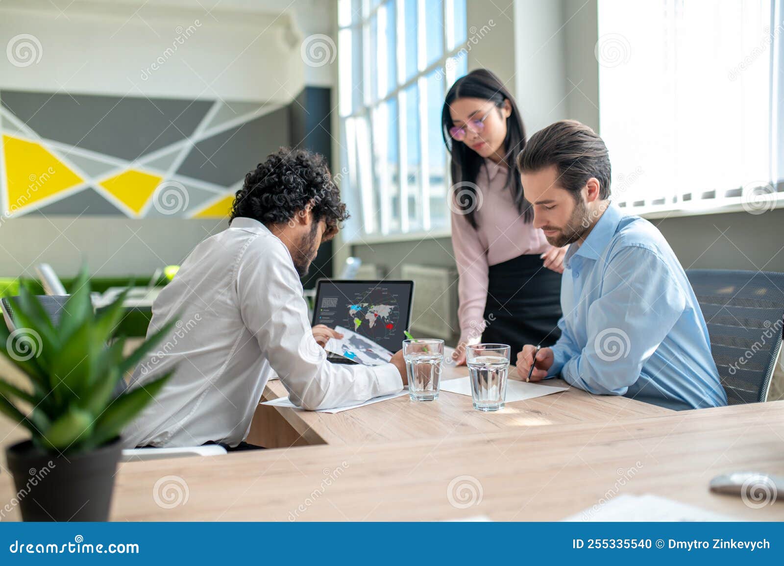 Team of Professionals Working Together in the Office Stock Photo ...