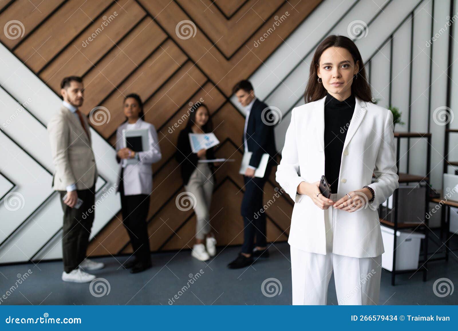 Office Manager Against the Background of Employees Waiting for an ...