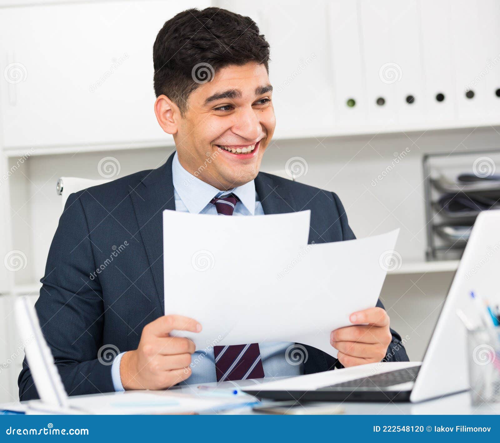 Office Manager is Reading Documents about the Transaction Stock Photo ...