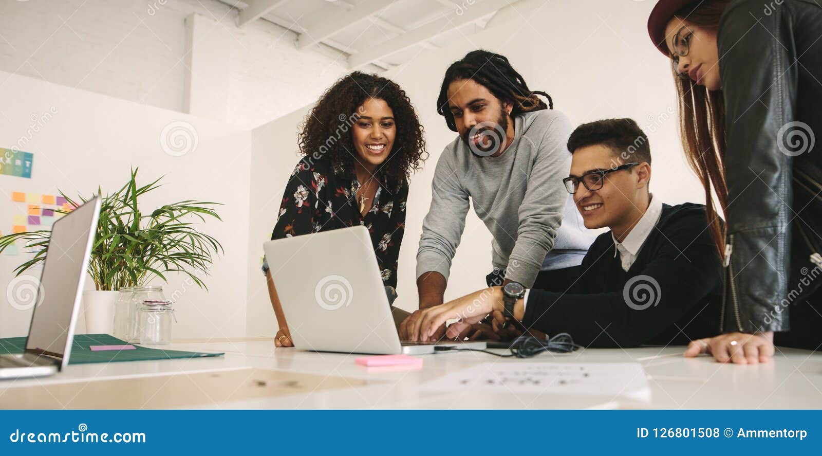Office Mates Working Together As a Team on a Computer Stock Photo ... Office Mates Working Together As a Team on a Computer Stock Photo ...