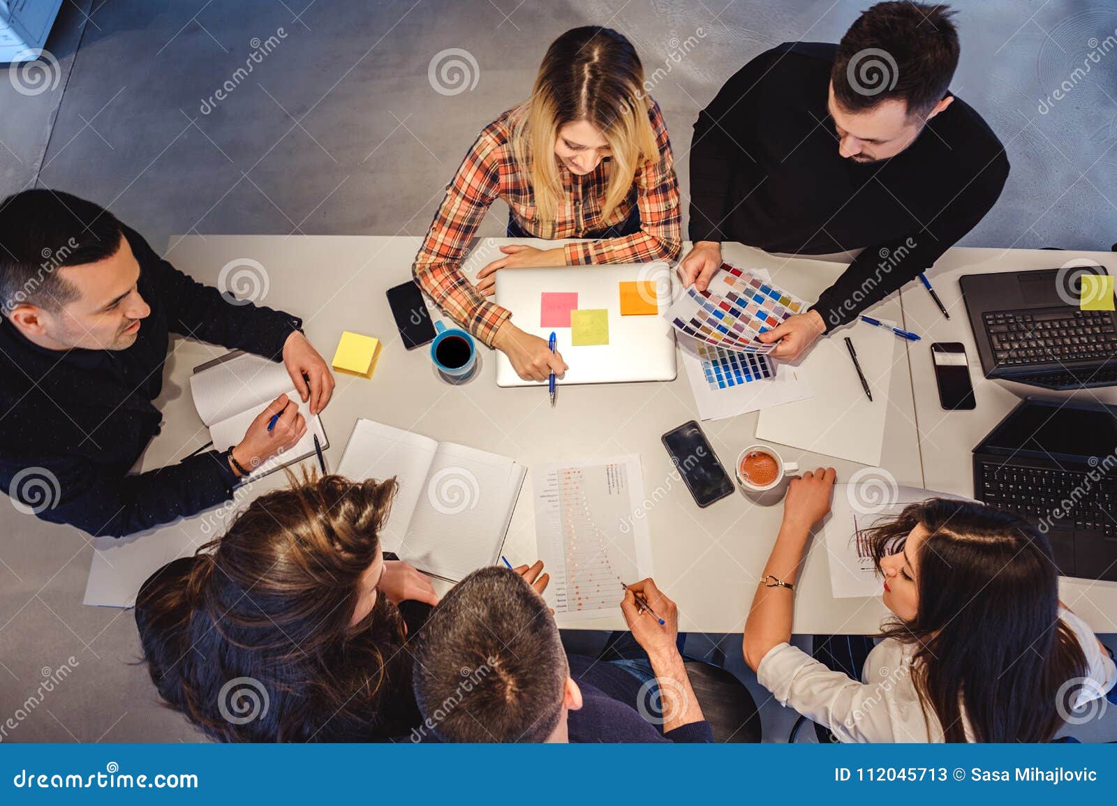 Office meeting from above stock image. Image of notepad - 112045713