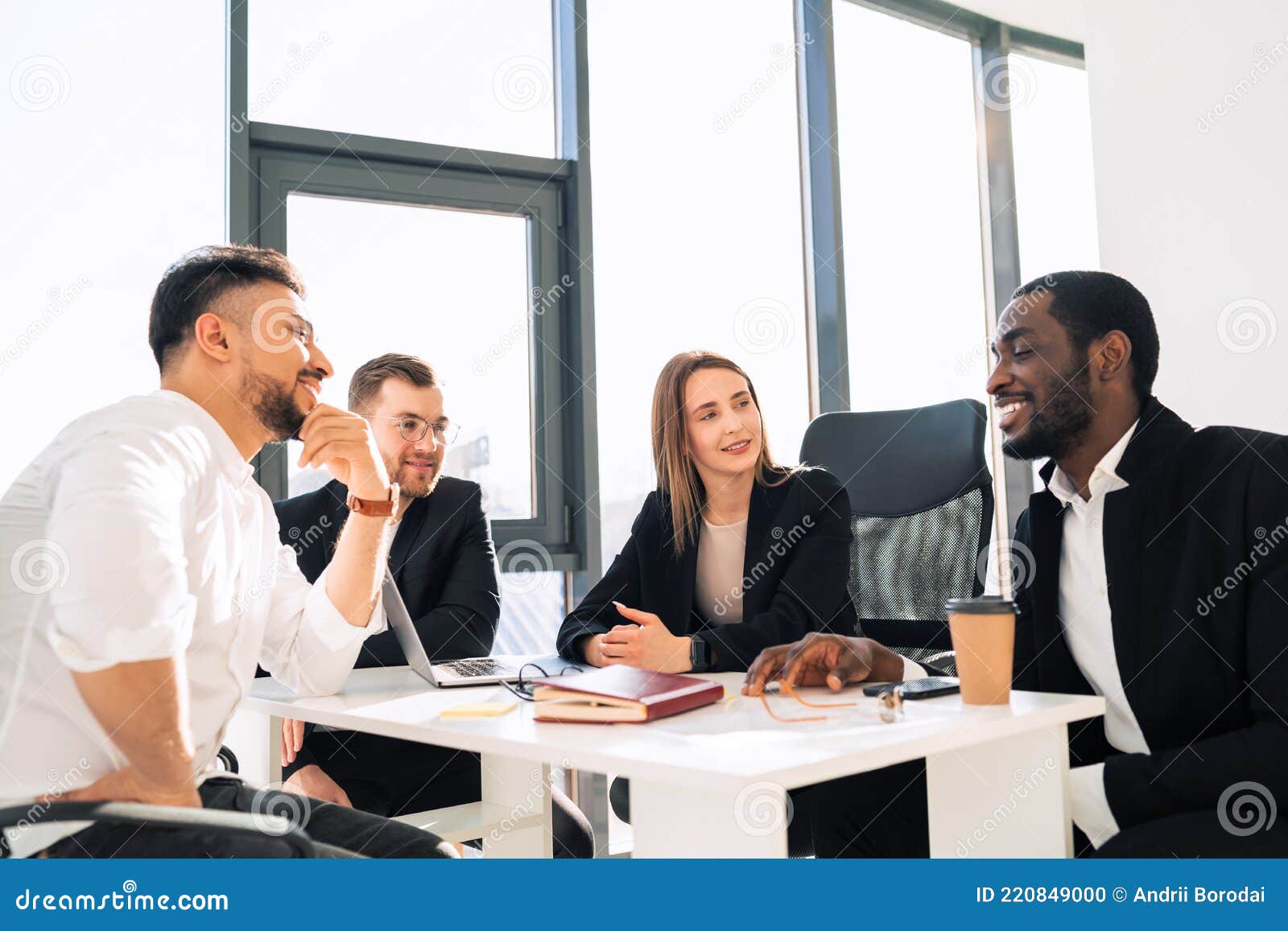 Office Meeting of a Group of Young Company Workers. Stock Photo - Image ...