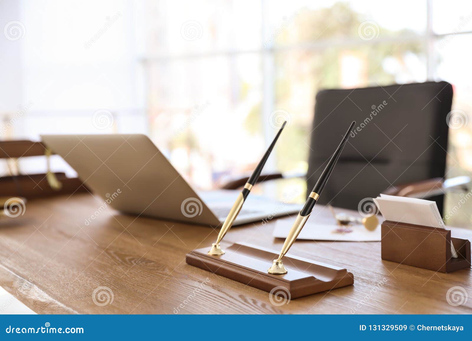 Office pen holder on desk stock image. Image of desk - 131329509