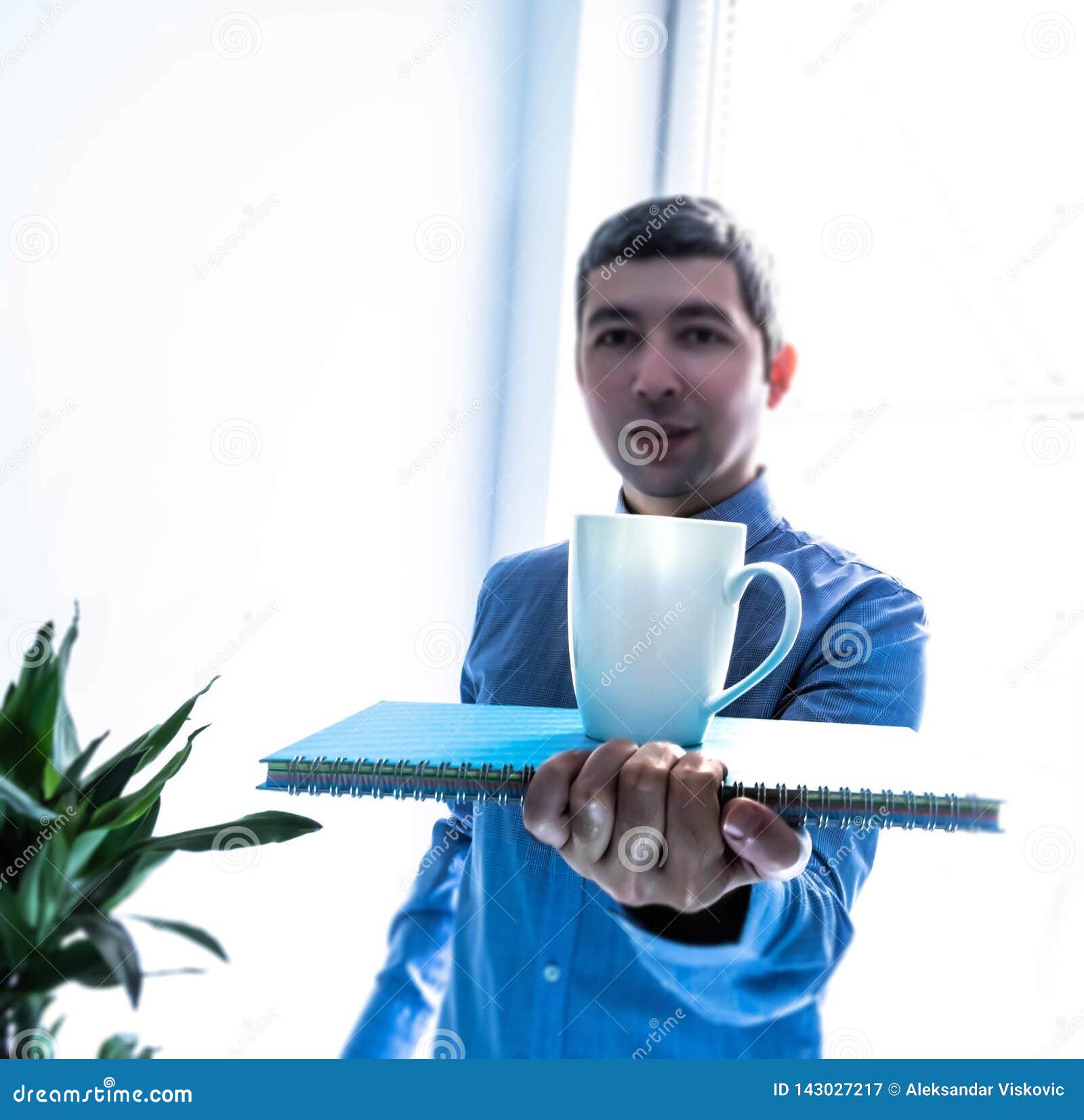 Office Worker Offering Coffee Stock Image - Image of shirt, phone ...