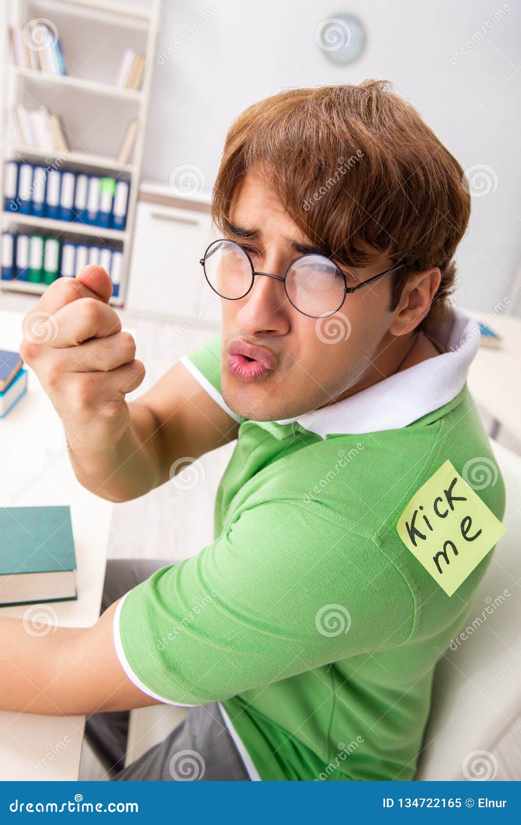 The Office Prank with Kick Me Message on Sticky Note Stock Image ...