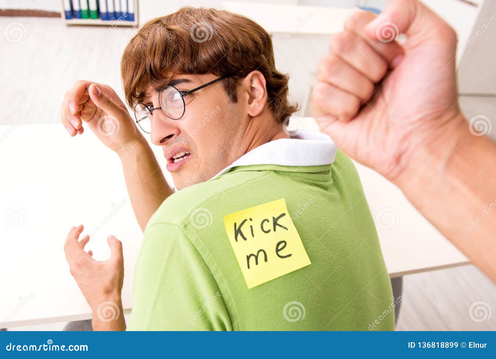 The Office Prank with Kick Me Message on Sticky Note Stock Image ...