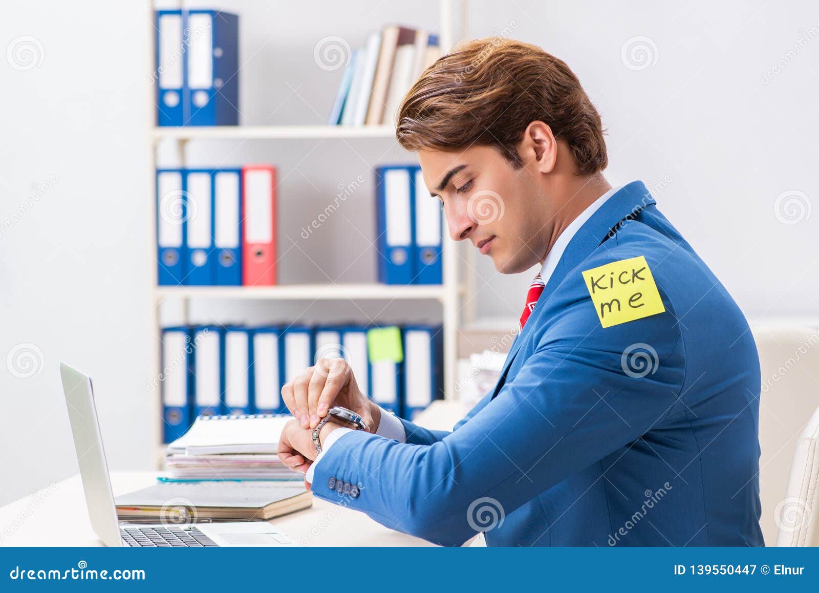 The Office Prank with Kick Me Message on Sticky Note Stock Image ...