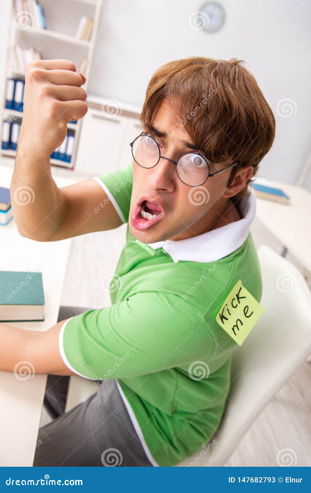 The Office Prank with Kick Me Message on Sticky Note Stock Image ...