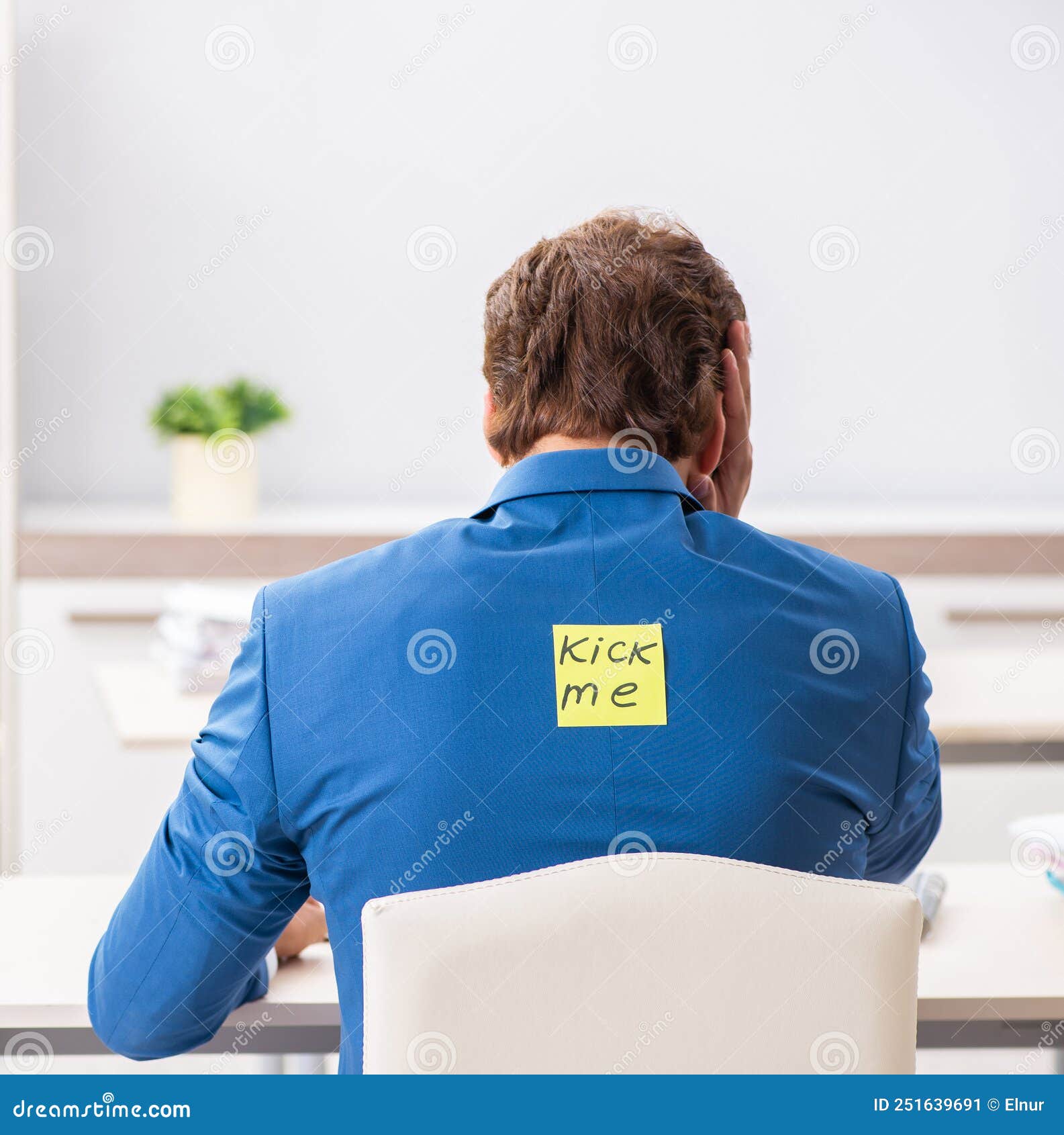 Office Prank with Kick Me Message on Sticky Note Stock Image - Image of ...