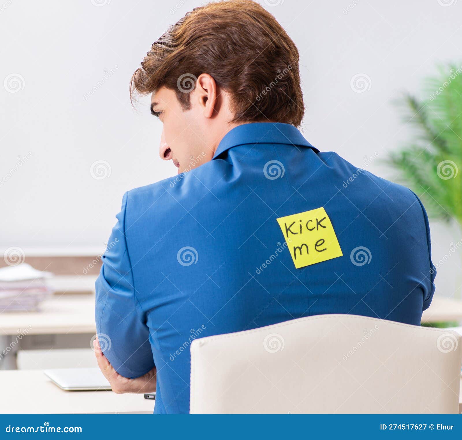 Office Prank with Kick Me Message on Sticky Note Stock Image - Image of ...