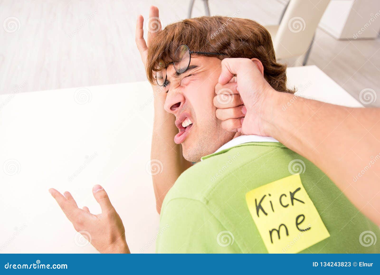 The Office Prank with Kick Me Message on Sticky Note Stock Image ...