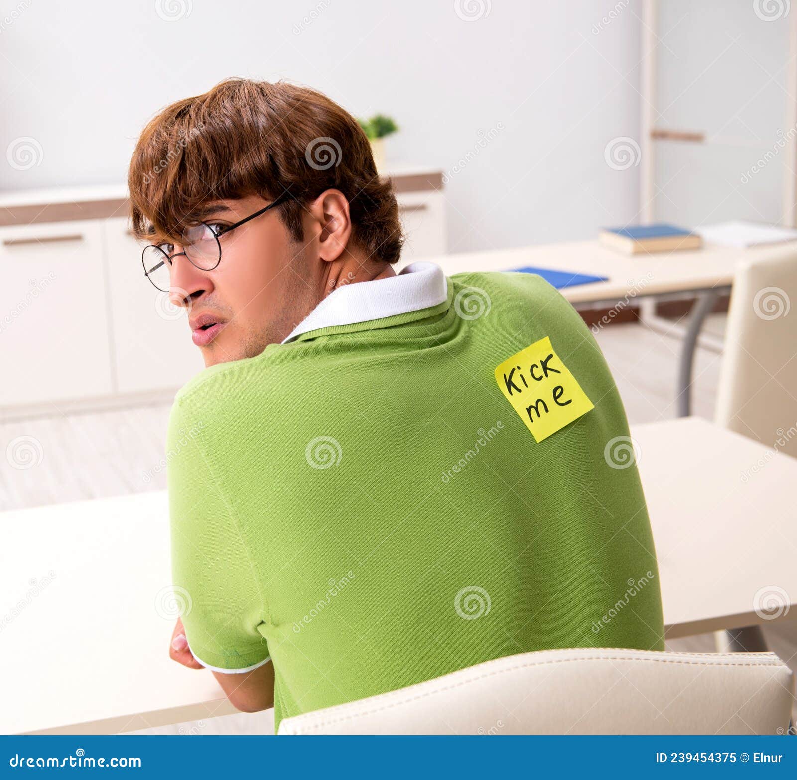 The Office Prank with Kick Me Message on Sticky Note Stock Image ...