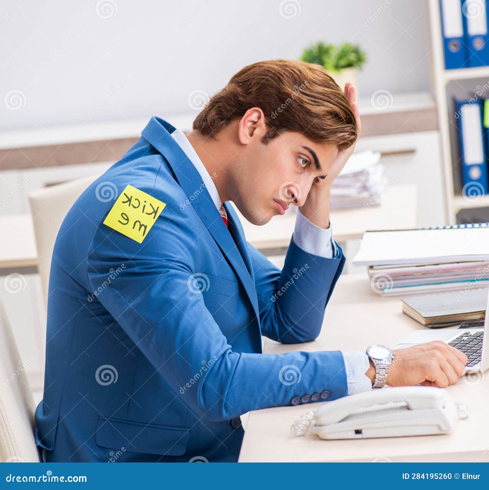 Office Prank with Kick Me Message on Sticky Note Stock Photo - Image of ...