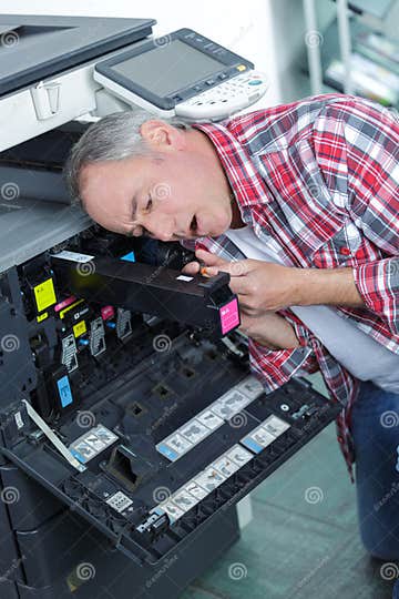 Office Printing Machine Technician at Work Stock Photo - Image of ...
