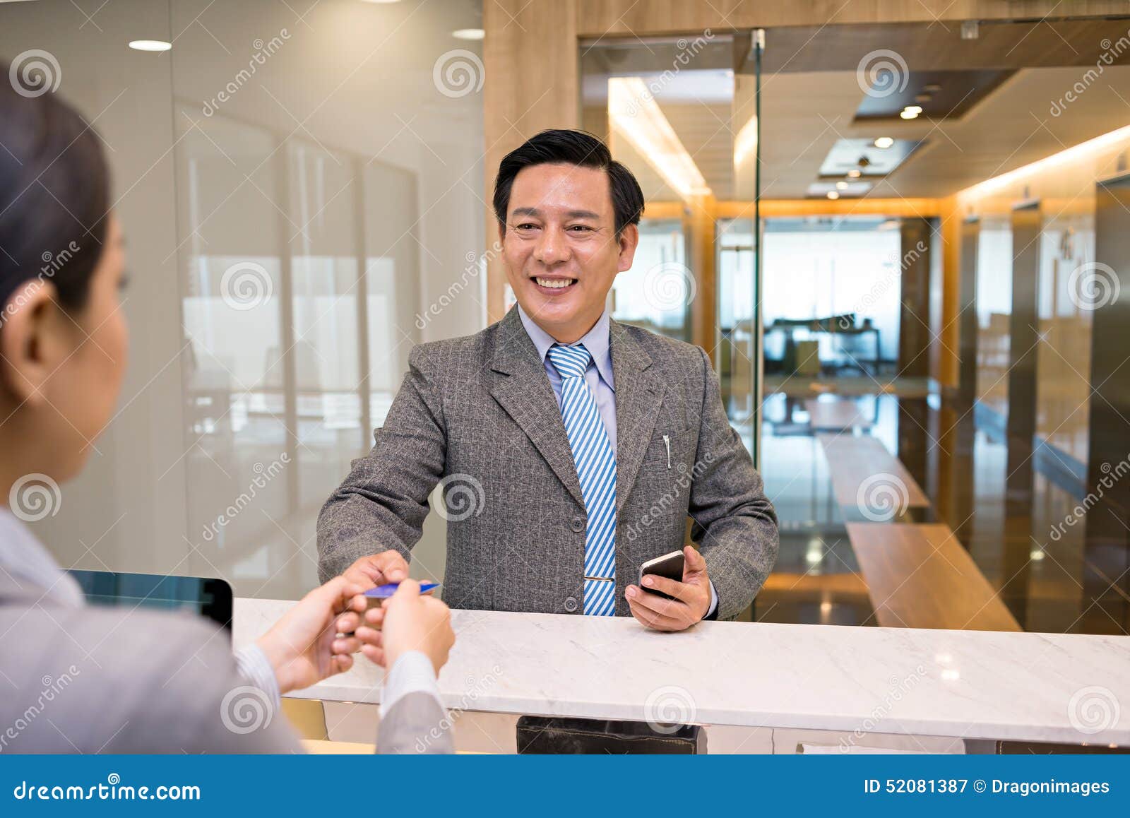 At the office reception stock image. Image of businessman - 52081387