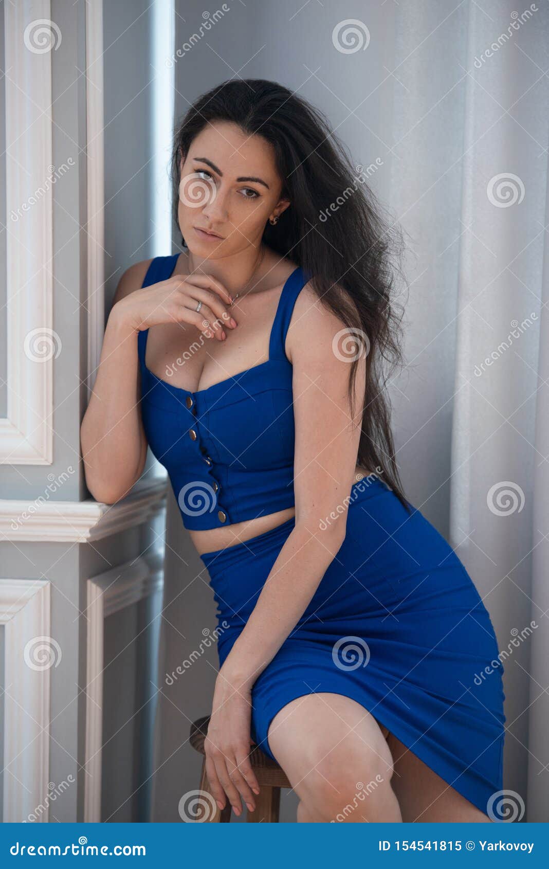 Office Romance In The Workplace Seductive Businesswoman Secretary In Blue Dress Sitting On A 0681