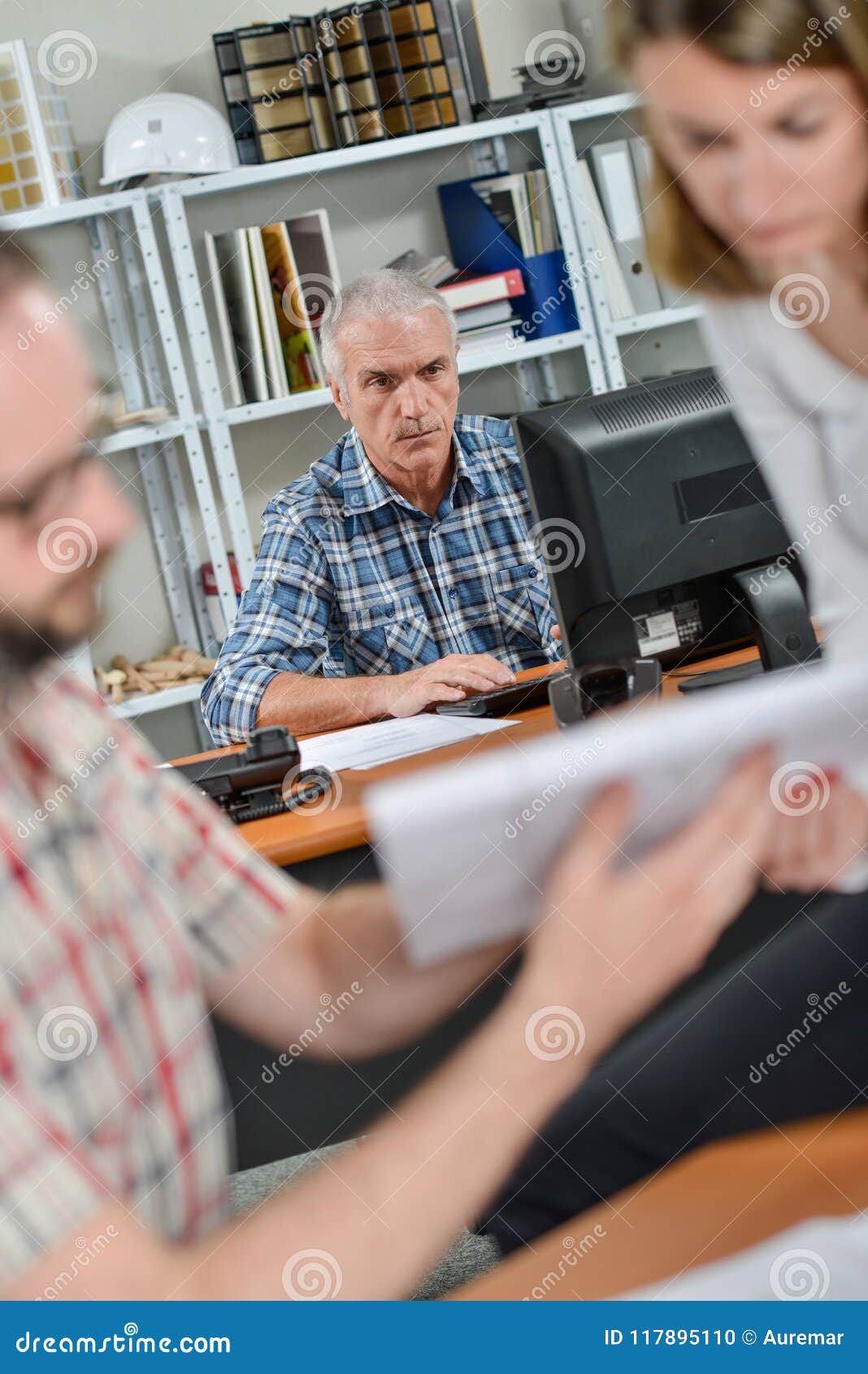 Office scene three workers stock photo. Image of career - 117895110