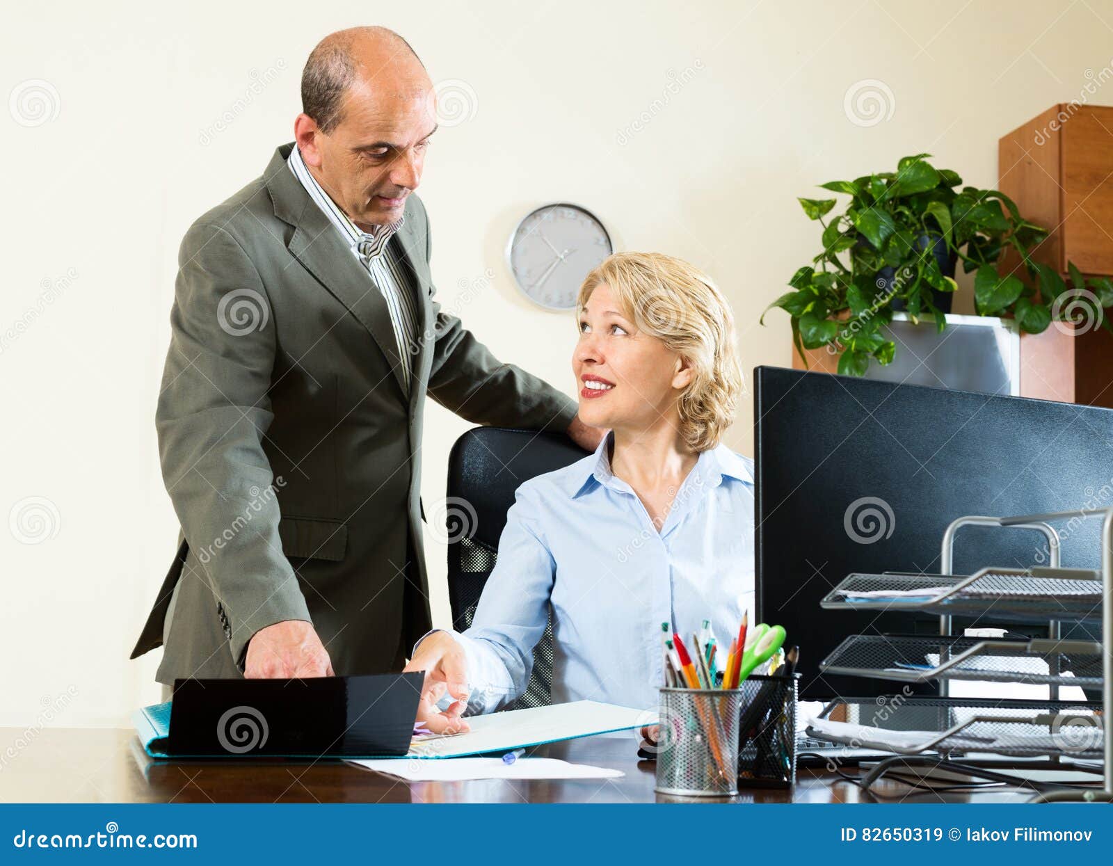 Office Scene with Two Aged and Positive Workers Stock Image - Image of ...