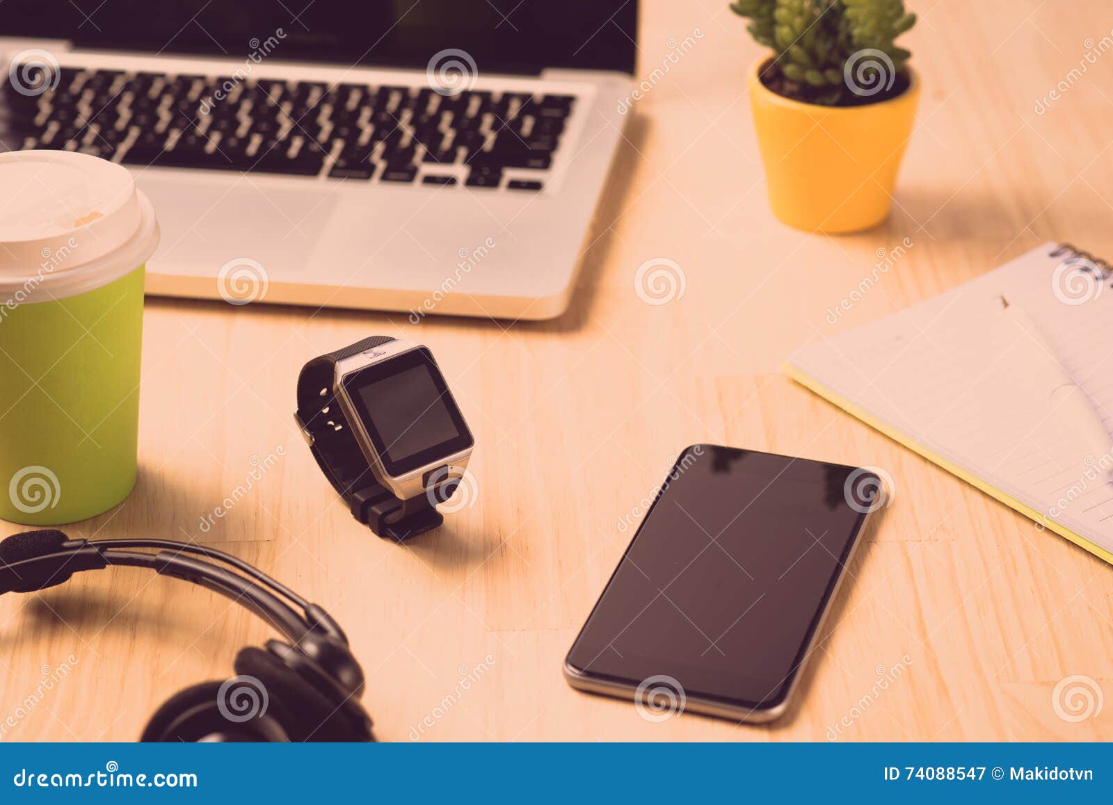 Office Setup. Close Up of Two Laptops, Tablet and a Smartwatch on a ...