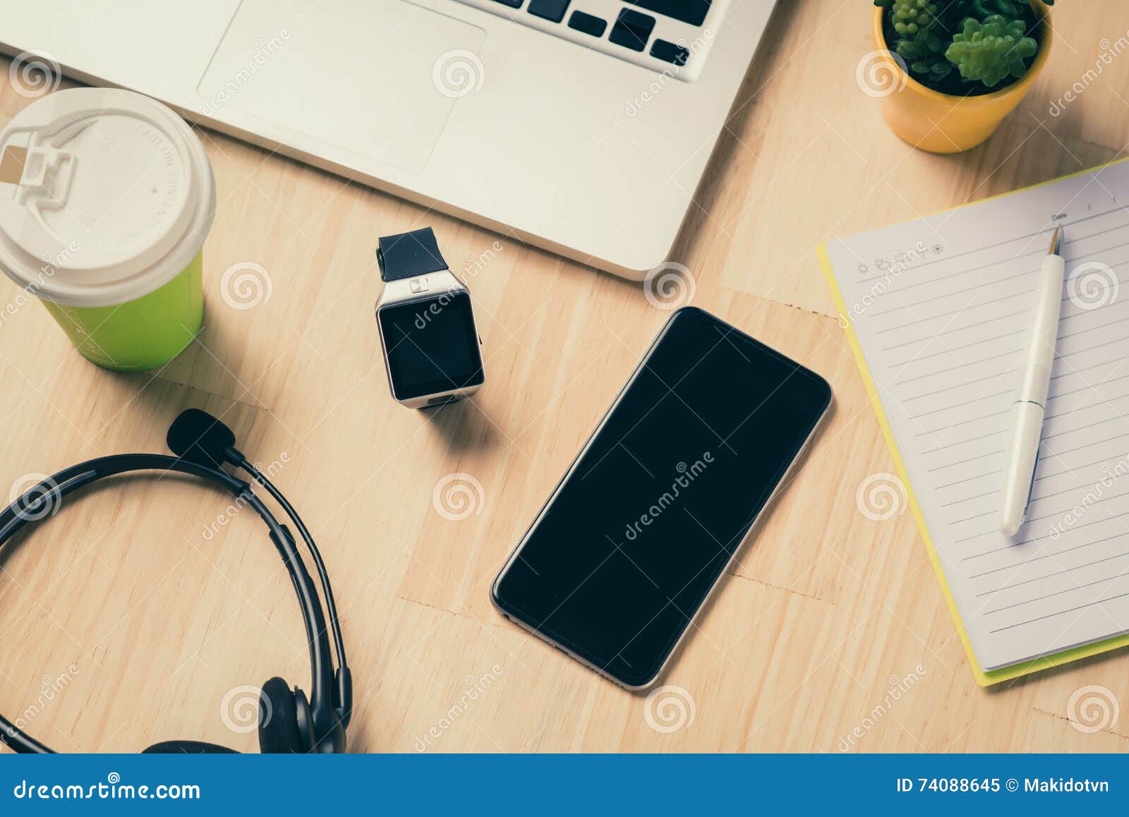 Office Setup. Close Up of Two Laptops, Tablet and a Smartwatch on a ...